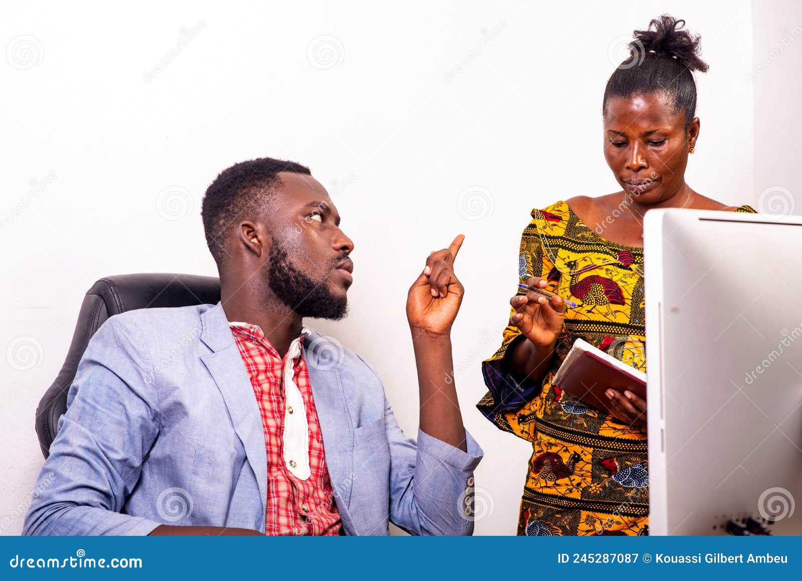 Secretary Taking Notes in the Notebook Under Order of the Boss at the ...