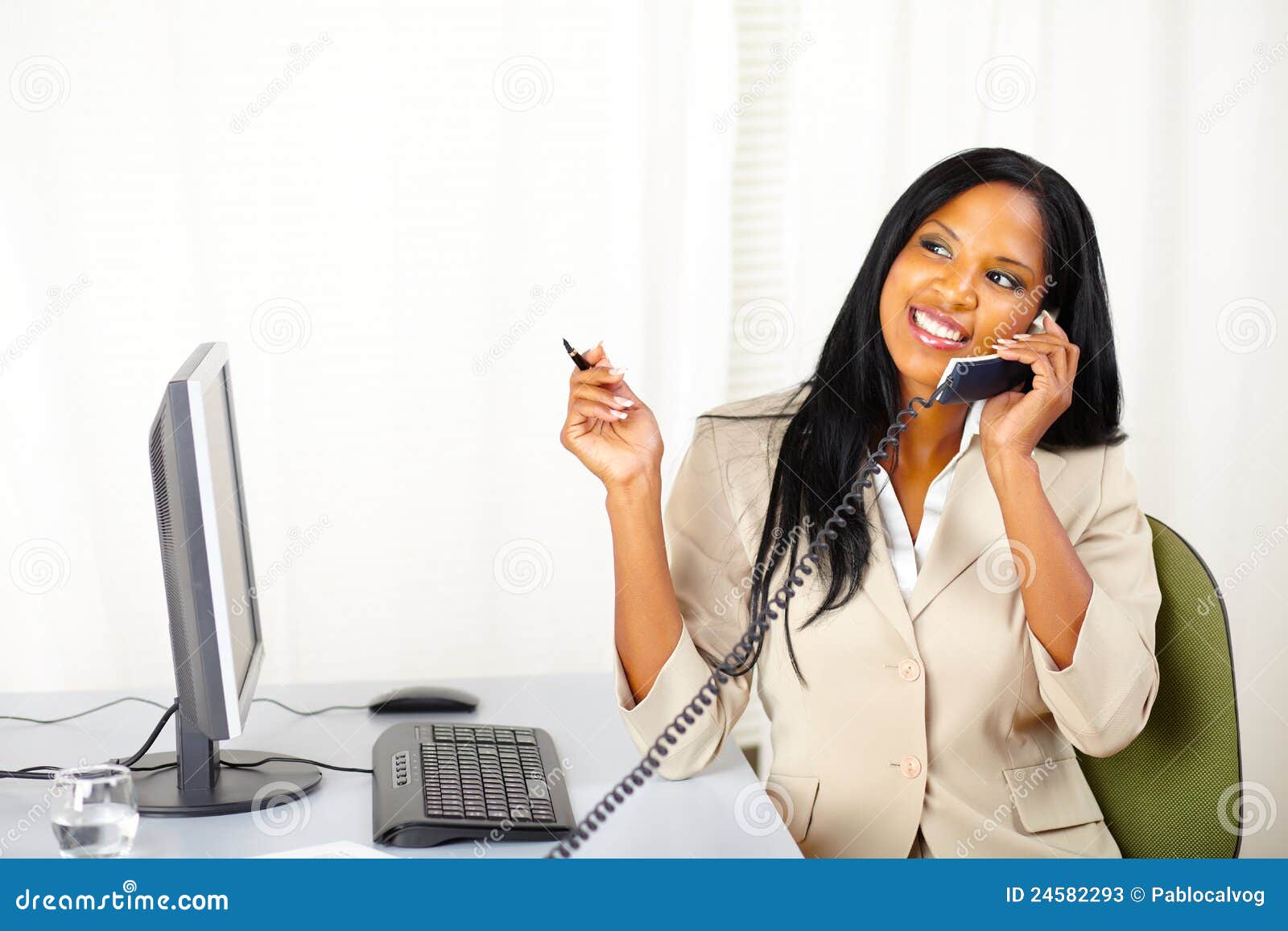 Secretary talking on phone stock image. Image of hold - 24582293