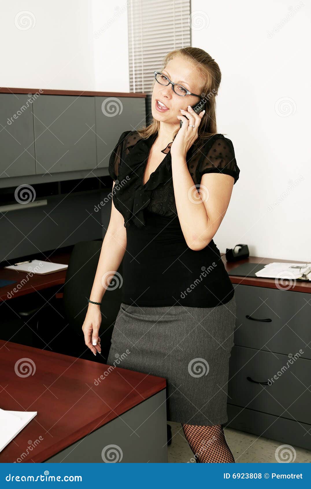 Secretary Using Cell Phone stock photo. Image of call - 6923808