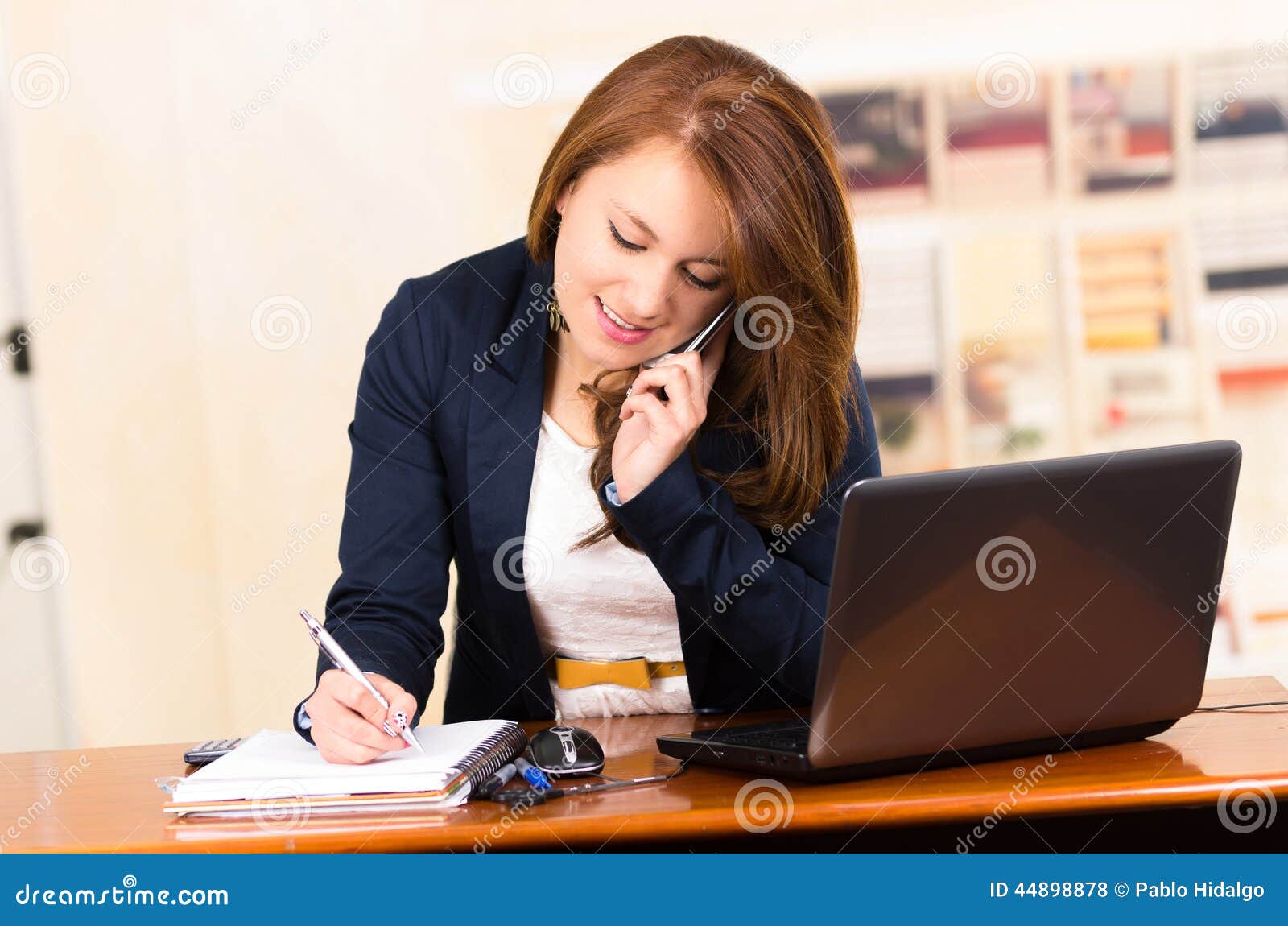 Secretary using cell phone stock photo. Image of paper - 44898878