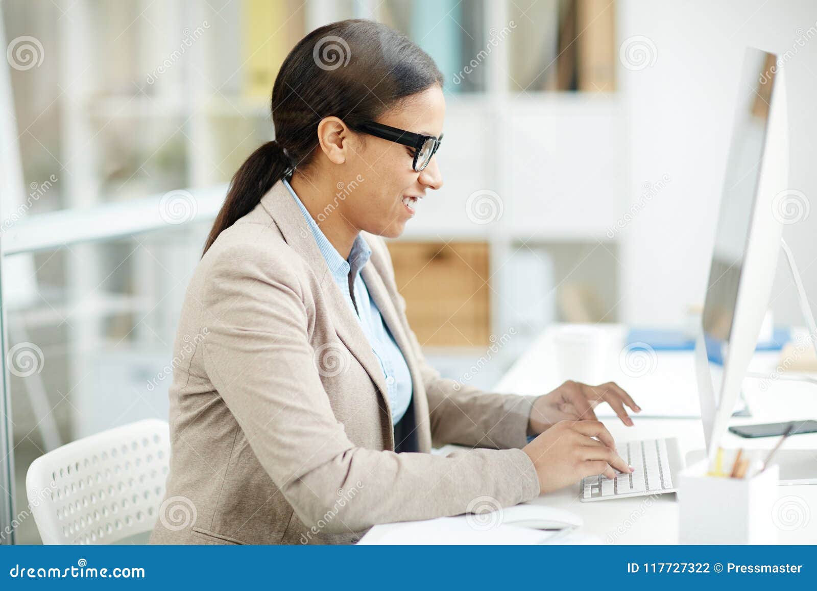 Secretary using computer stock photo. Image of professional - 117727322