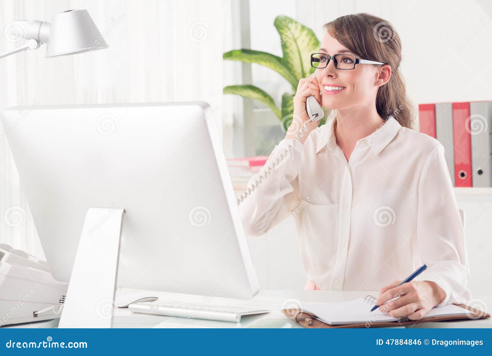 Secretary at work stock photo. Image of glasses, young - 47884846