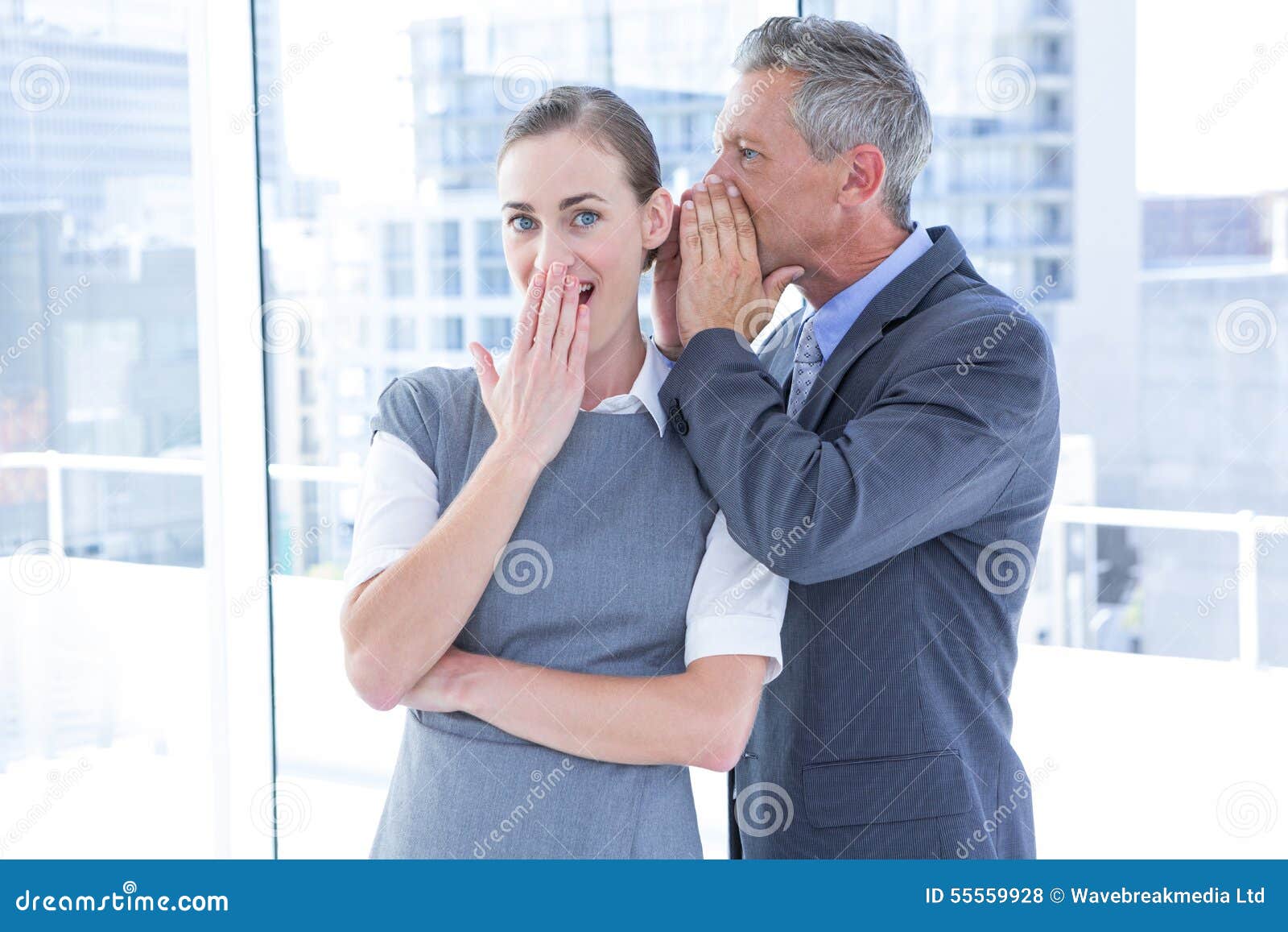 Secretive Business Colleagues Whispering Stock Photo - Image of ...