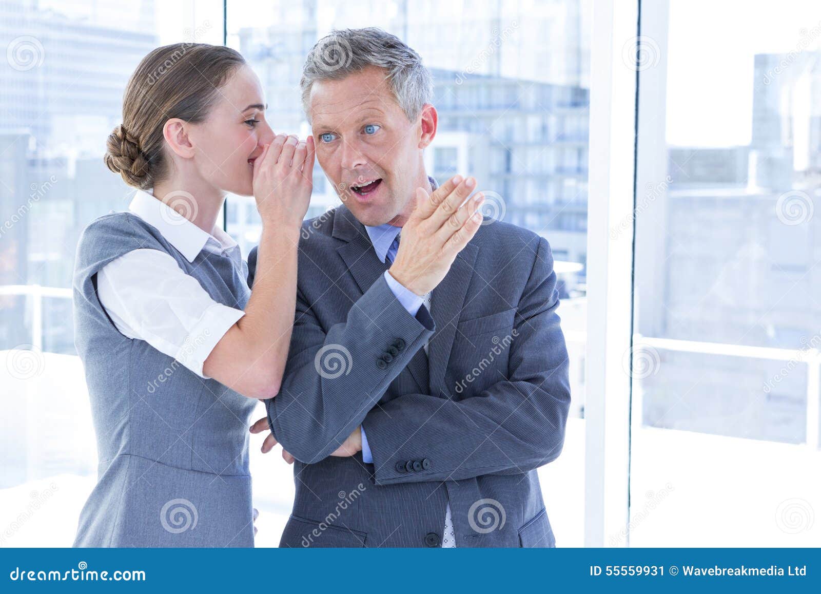 Secretive Business Colleagues Whispering Stock Image - Image of office ...