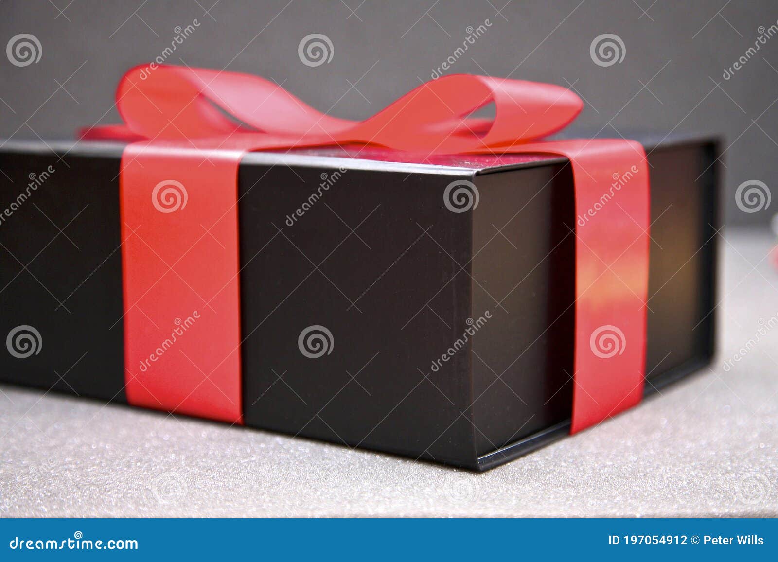 Black box and red ribbon stock photo. Image of gift - 197054912