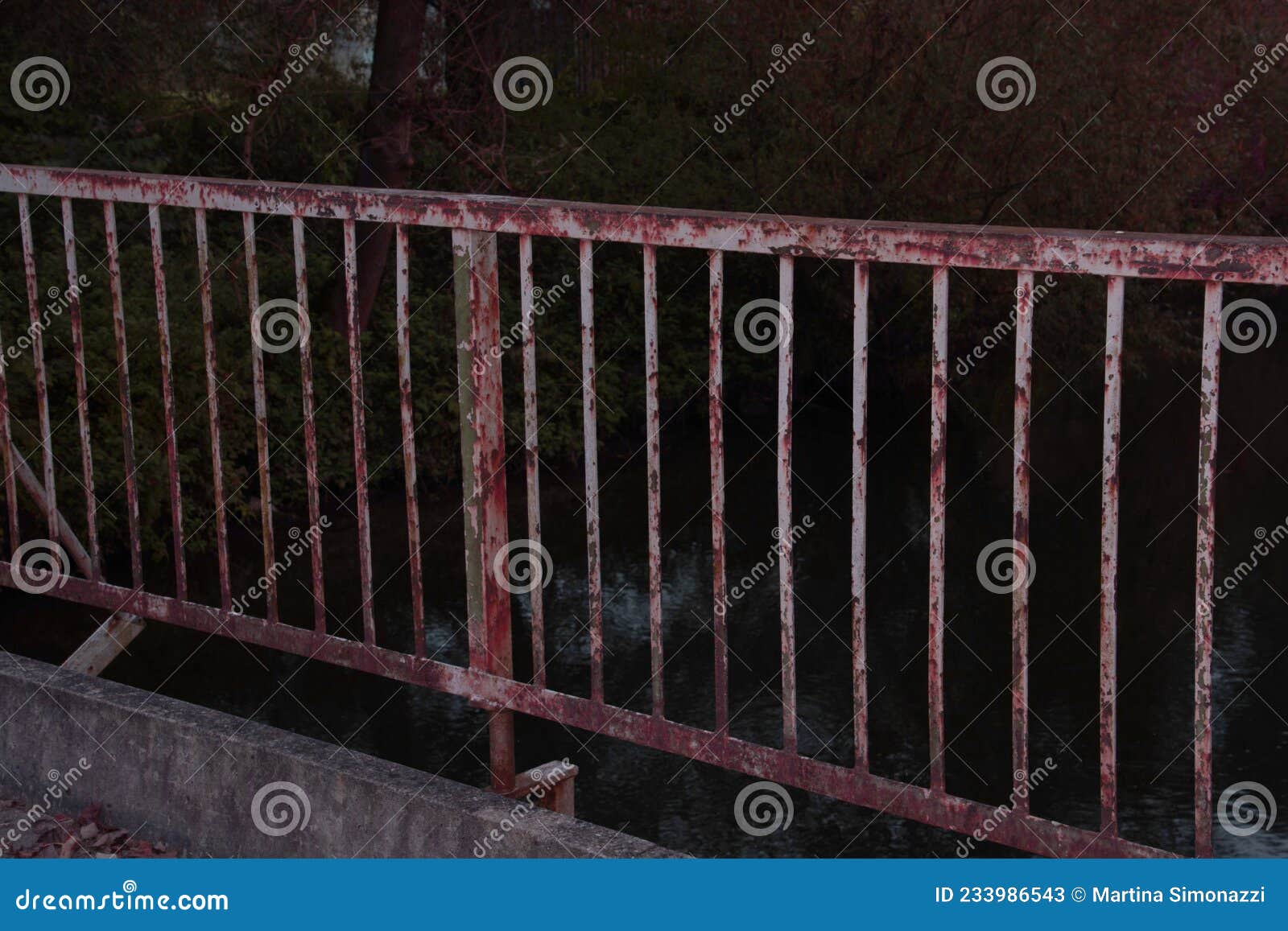 Section of a Bridge Railing in the Dark with Rust and Peeling Paint ...
