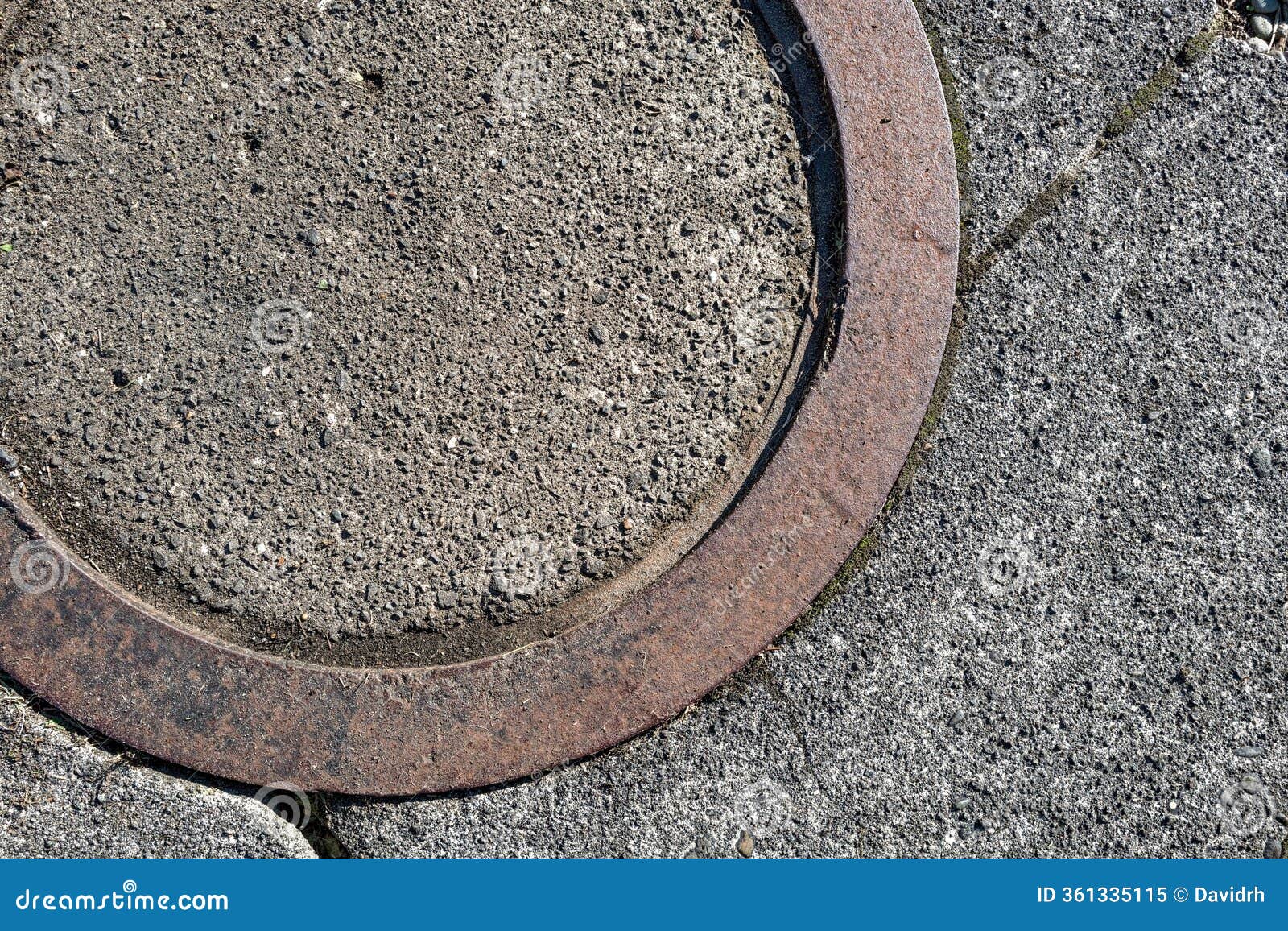 A Section of the Circular Metal Rim of a Drainpipe Cover in the ...