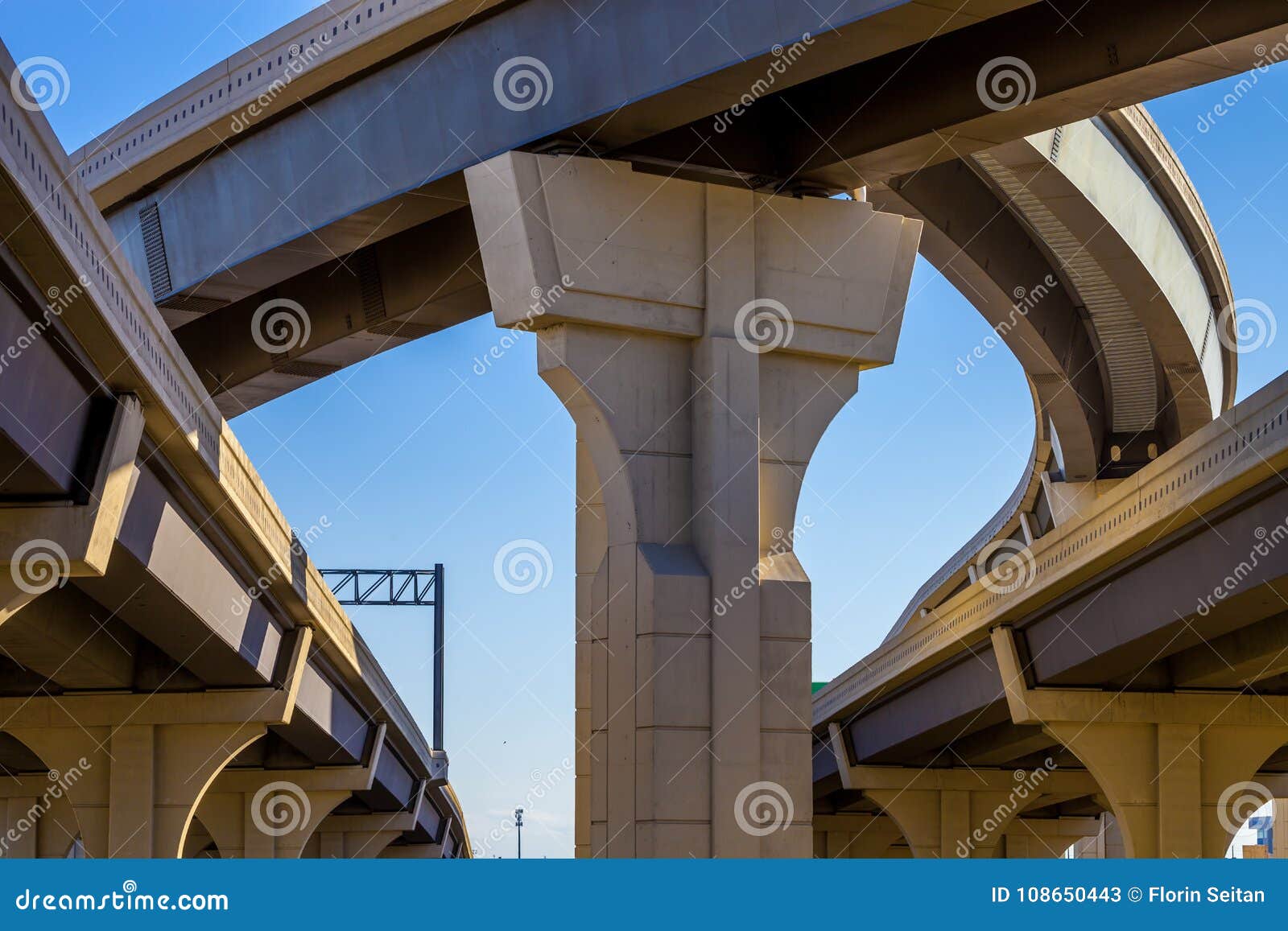 Section of Elevated Highway with Several Levels Against a Bright Blue ...