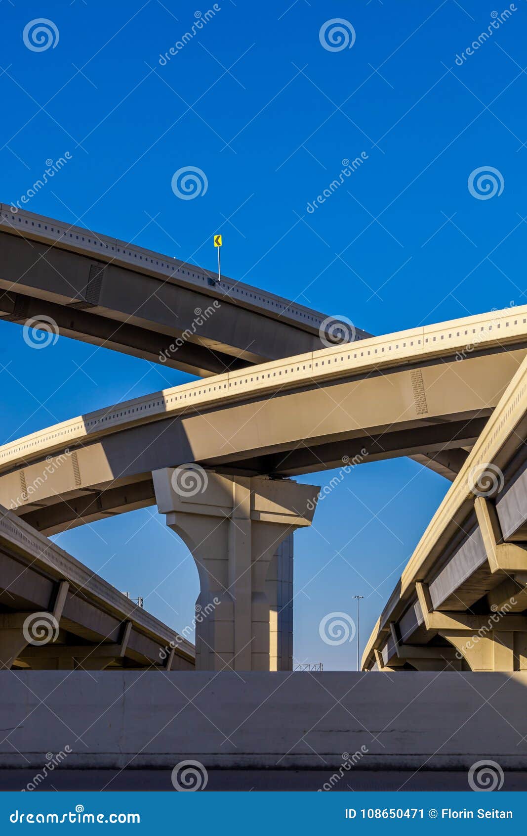 Section of Elevated Highway with Several Levels Against a Bright Blue ...