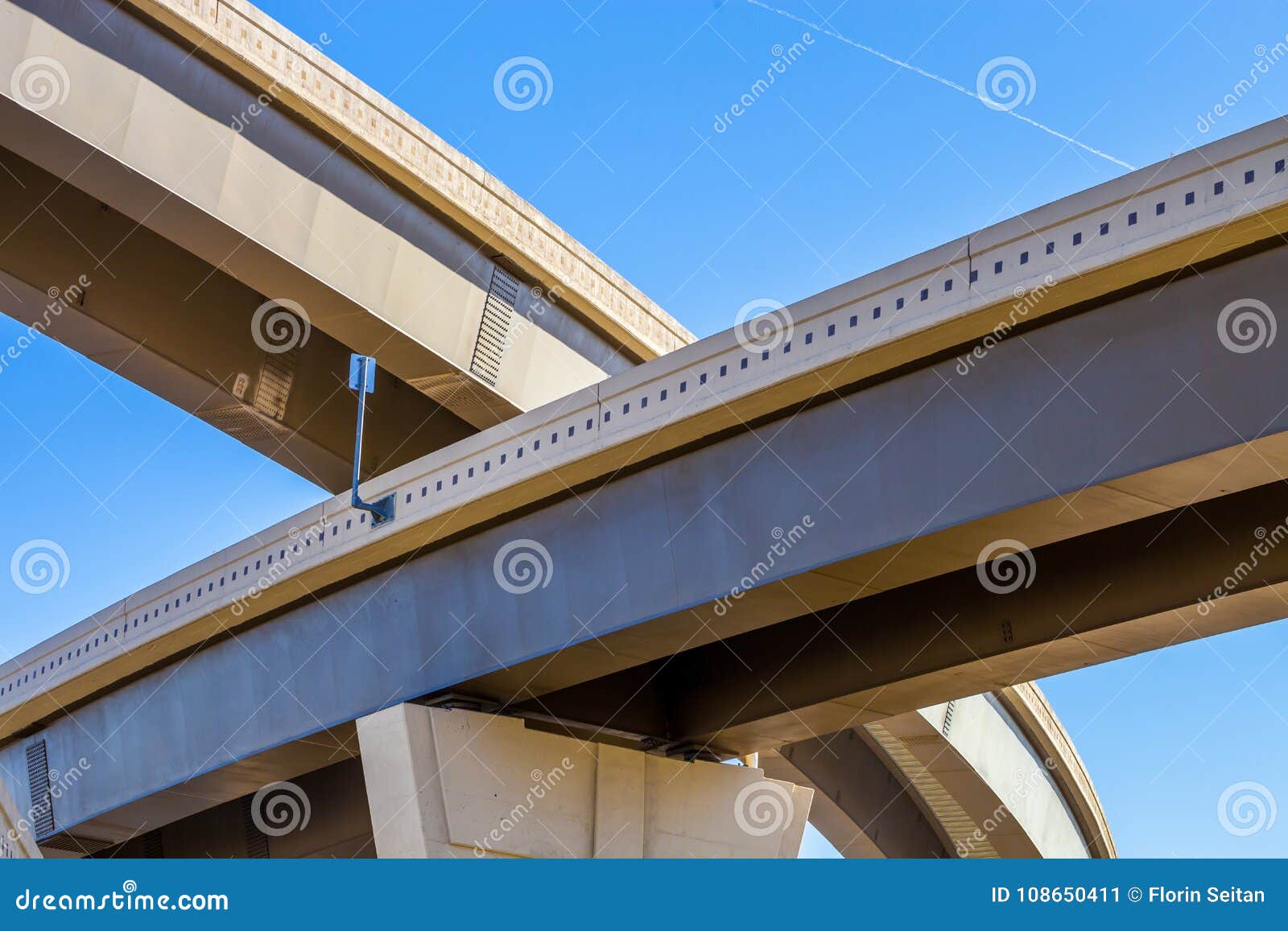 Section of Elevated Higway with Several Levels Against a Bright Stock ...