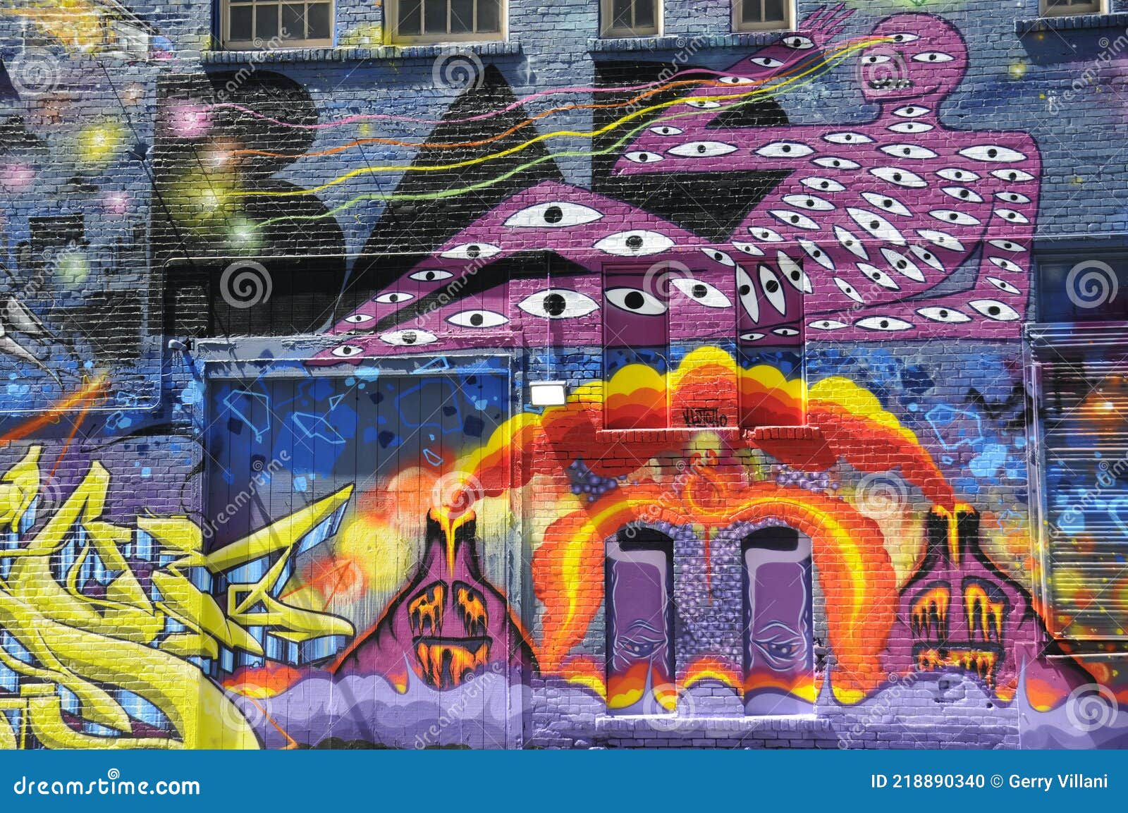 Building Wall Decorated In Coloured Graffiti Editorial Photo ...