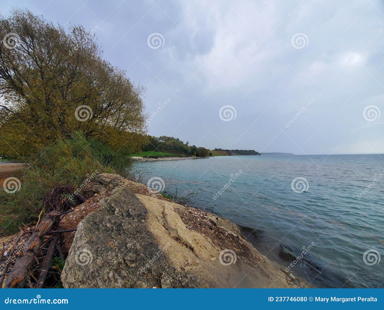 A Rocky Shoreline in Goderich, Ontario Stock Photo - Image of colours ...