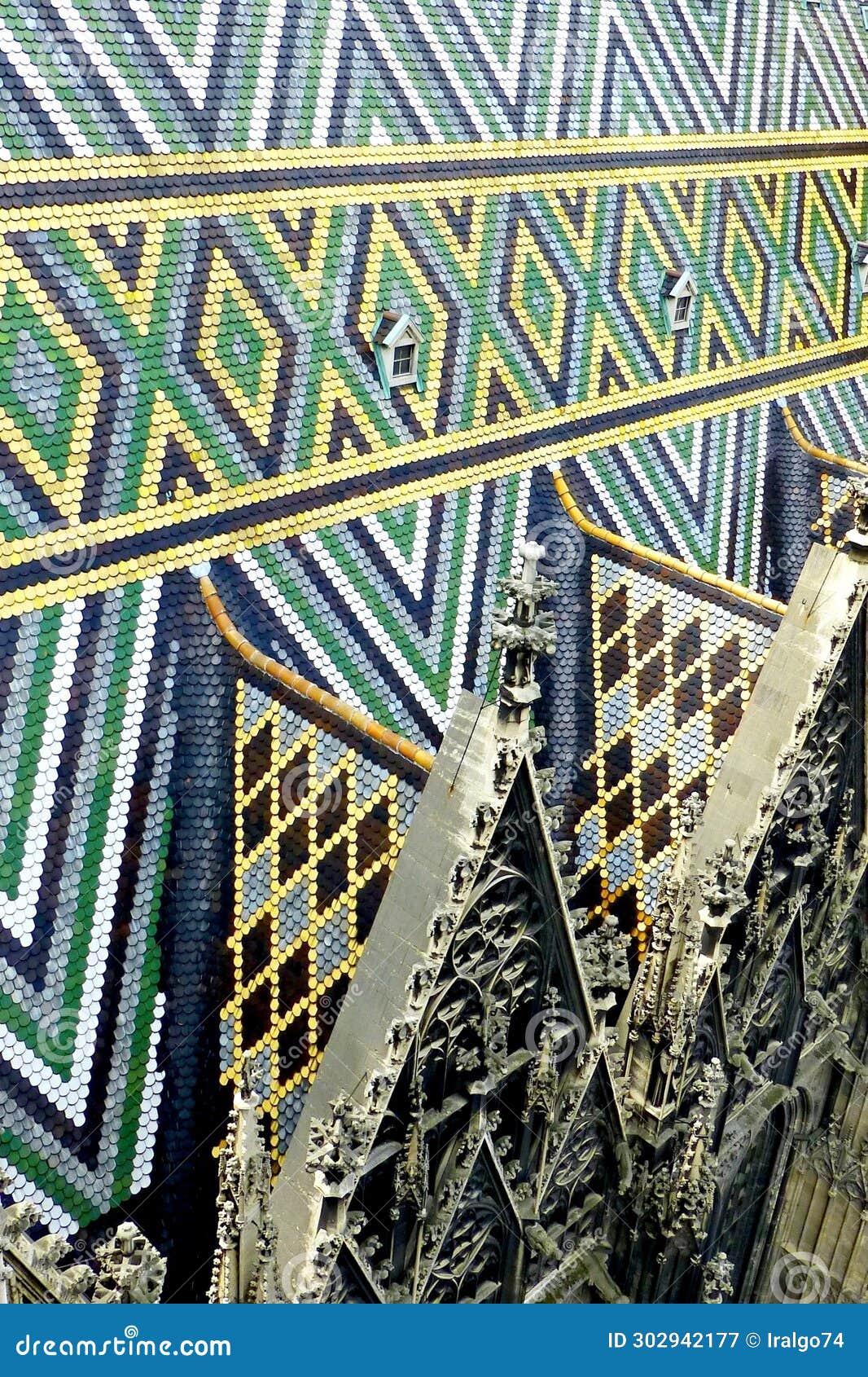 Fragment of a Multi-colored Mosaic Roof with Gothic Details and Small ...