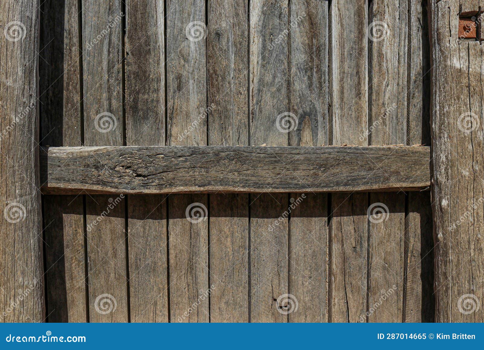 A Section of a Wharf with Vertical and Horizontal Wooden Beams and ...