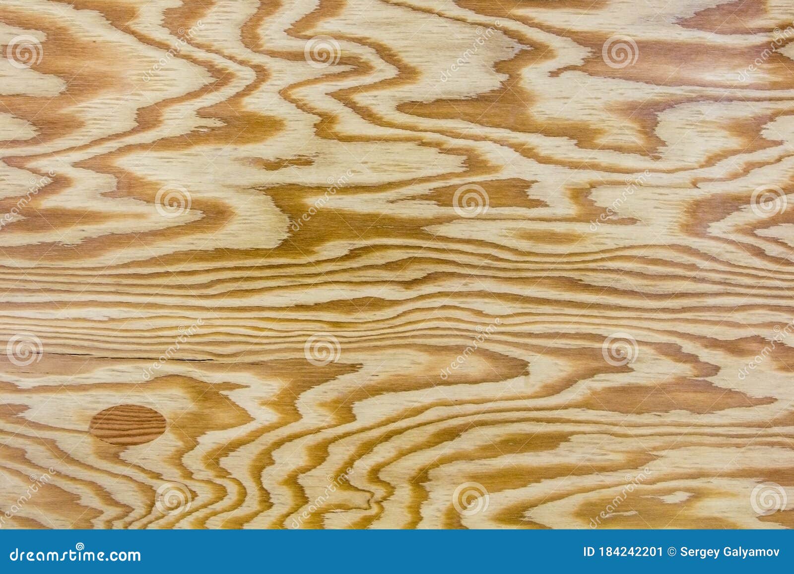 A Section Of Wood With A Natural Texture In The Form Of A Wavy Pattern ...