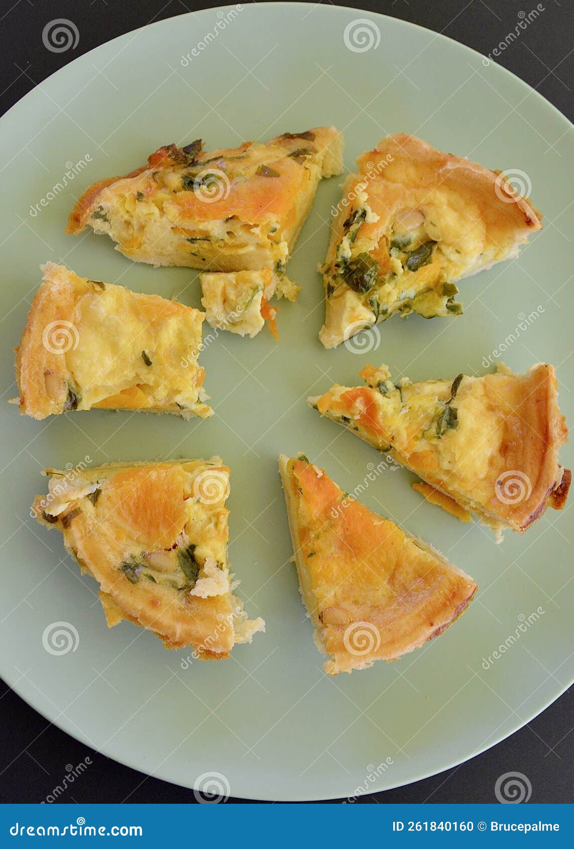 Sections of a Quiche on a Plate Stock Photo - Image of lunch, vegetable ...