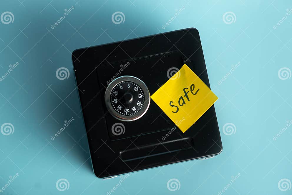 Secure Black Safe with Combination Lock and Sticky Note on Blue ...