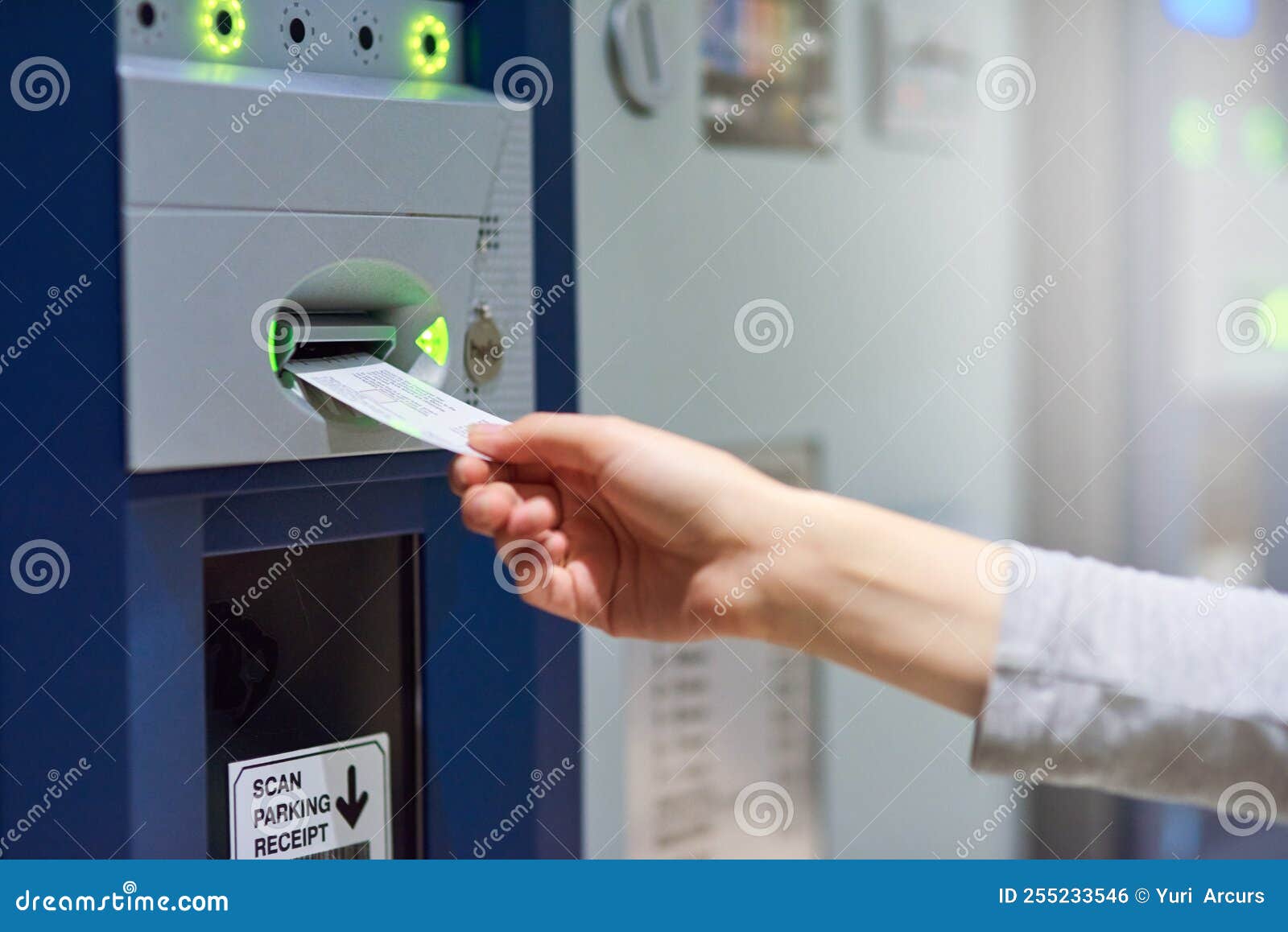 Secure Parking Has Its Price. an Unrecognizable Person Inserting a ...