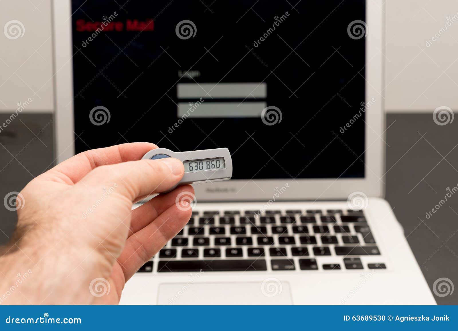 Secure Token in Front of a Laptop Stock Photo - Image of payment ...
