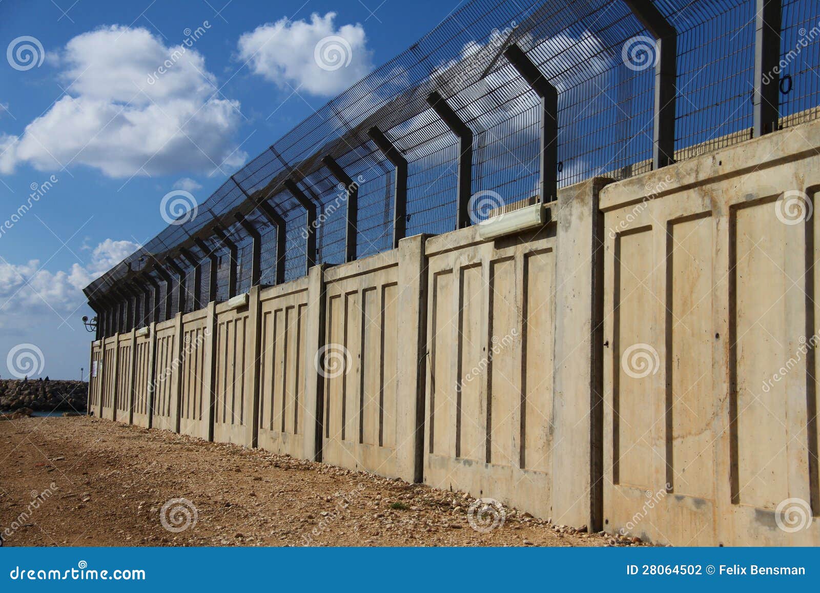 A Secured Industrial Zone with Concrete Fence Stock Photo - Image of ...