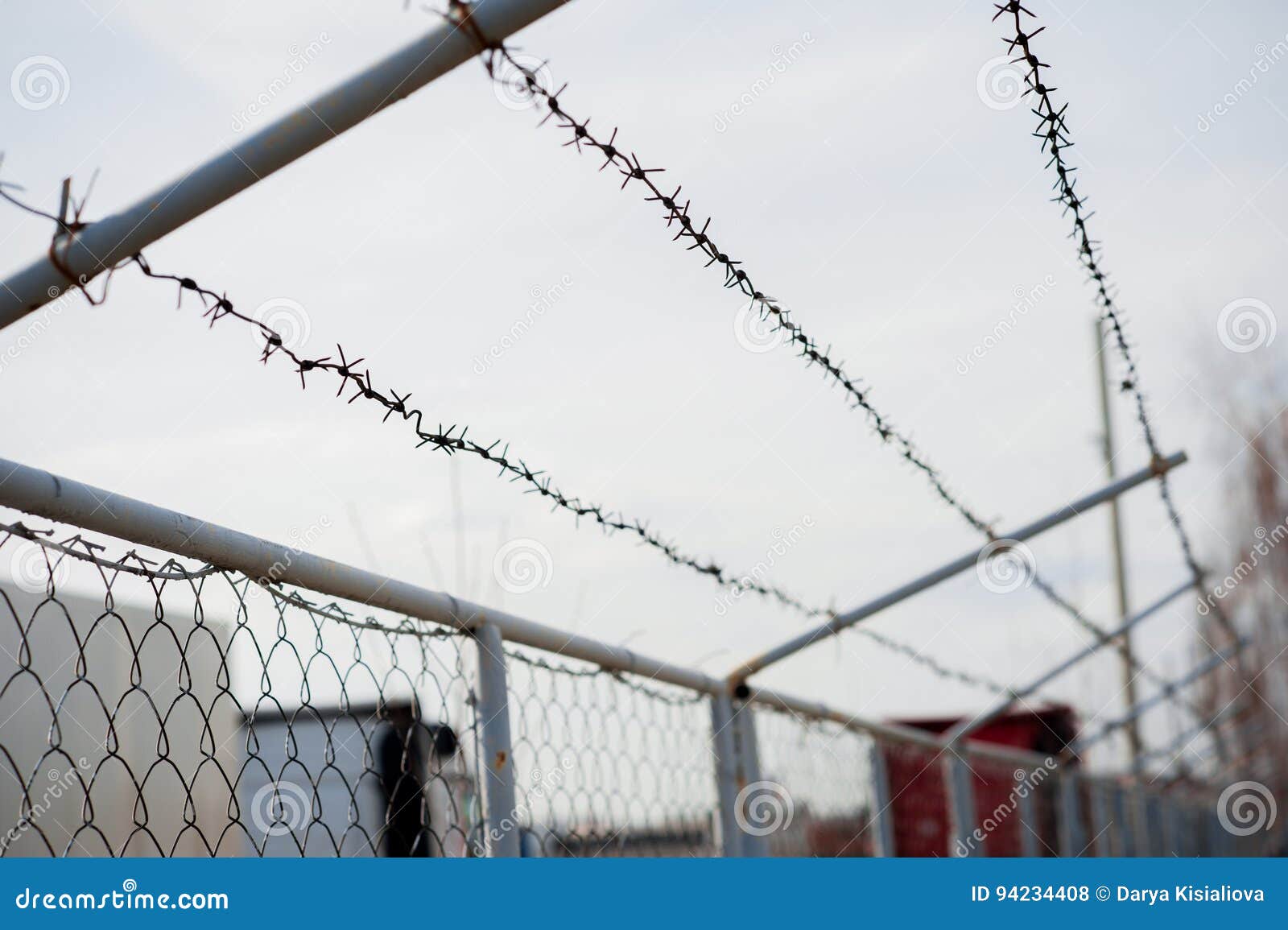 Security with a Barbed Wire Fence Stock Photo - Image of camera ...