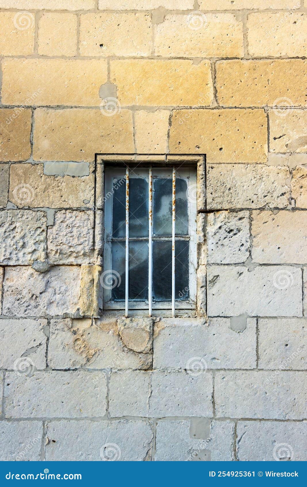 Security Bars on a Window in a Beautiful Textures Natural Stone Stock ...