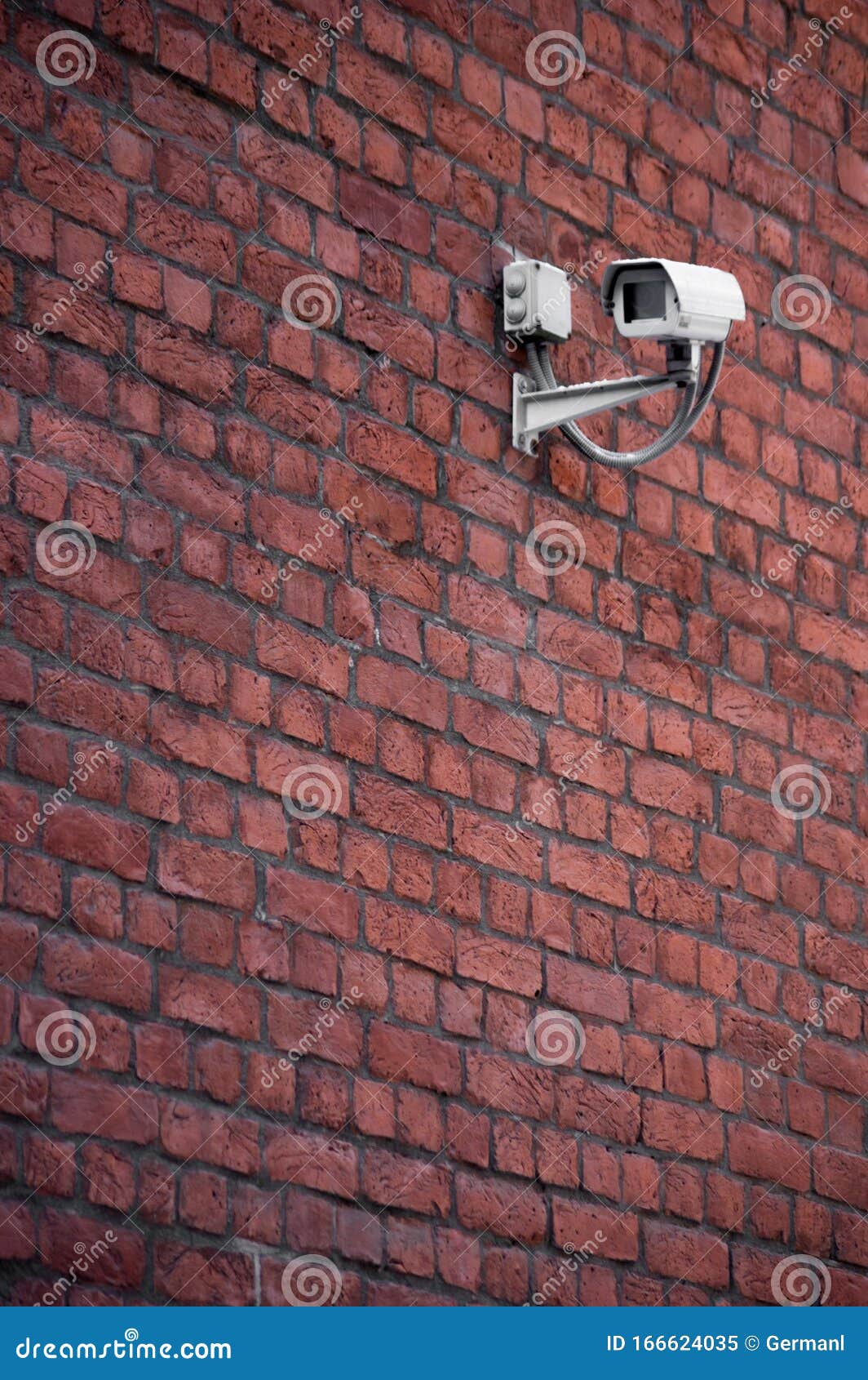 Security Camera on a Brick Wall Stock Image - Image of outdoor, alarm ...