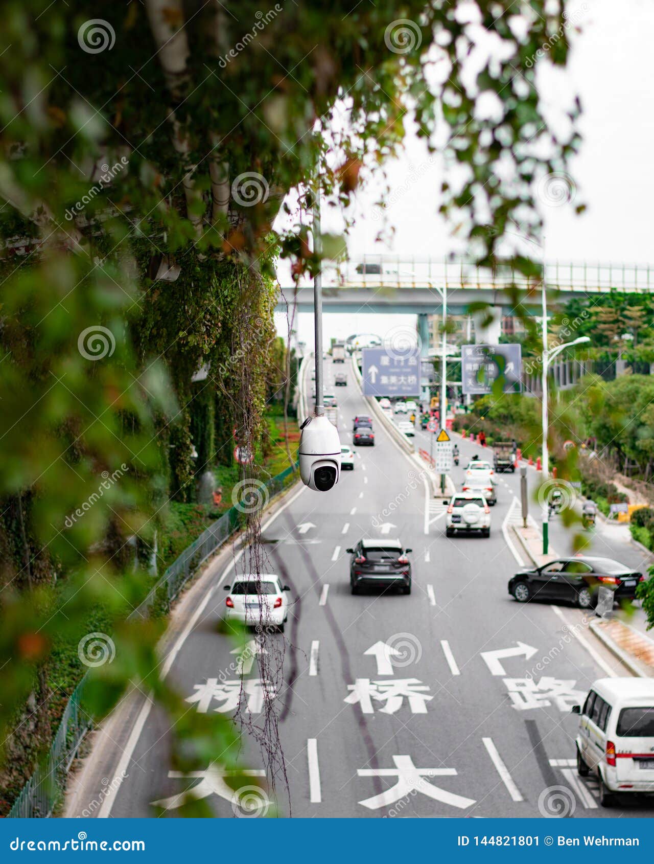 Security Camera on a Busy City Road Editorial Photo - Image of truck ...