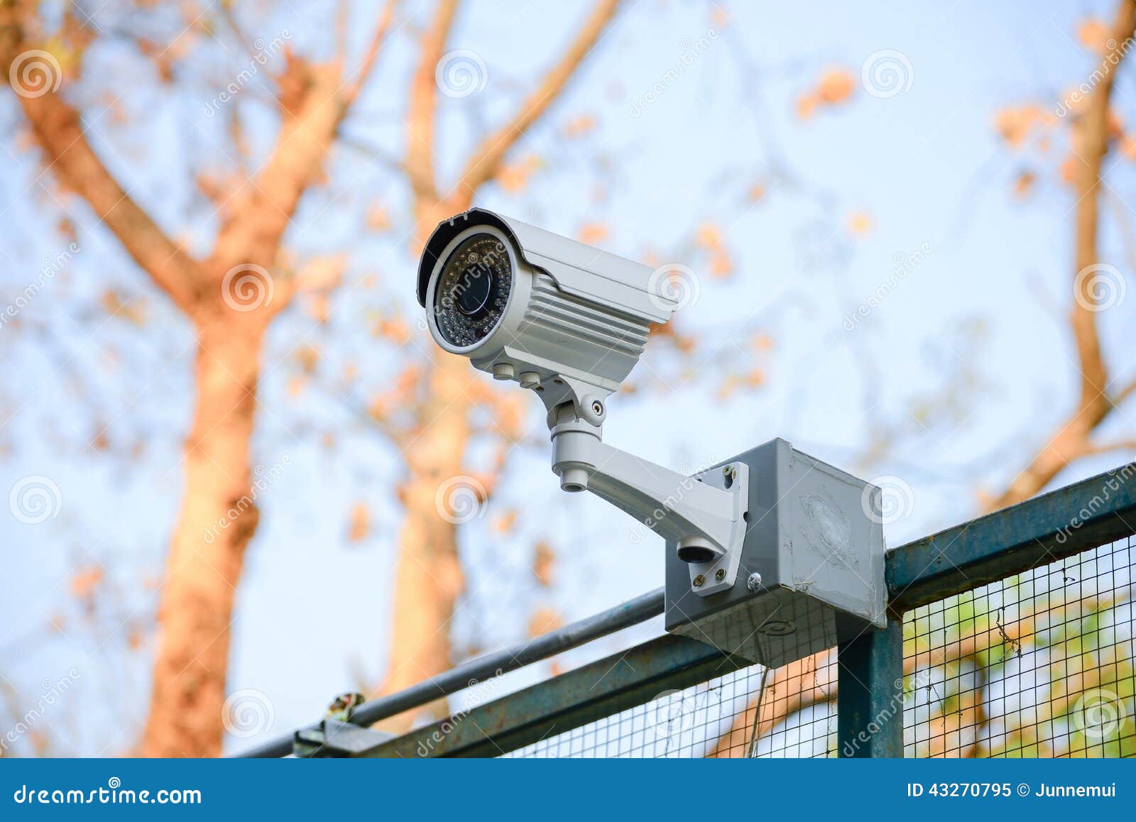 Security Camera CCTV Over Fence Blue Sky Stock Image - Image of city ...