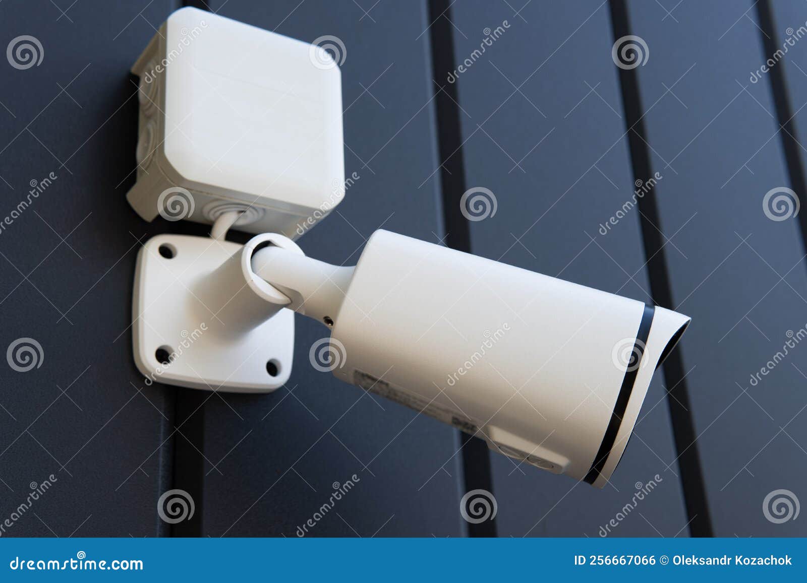 Security Camera on a Dark Wall, Outdoors. Stock Photo - Image of ...