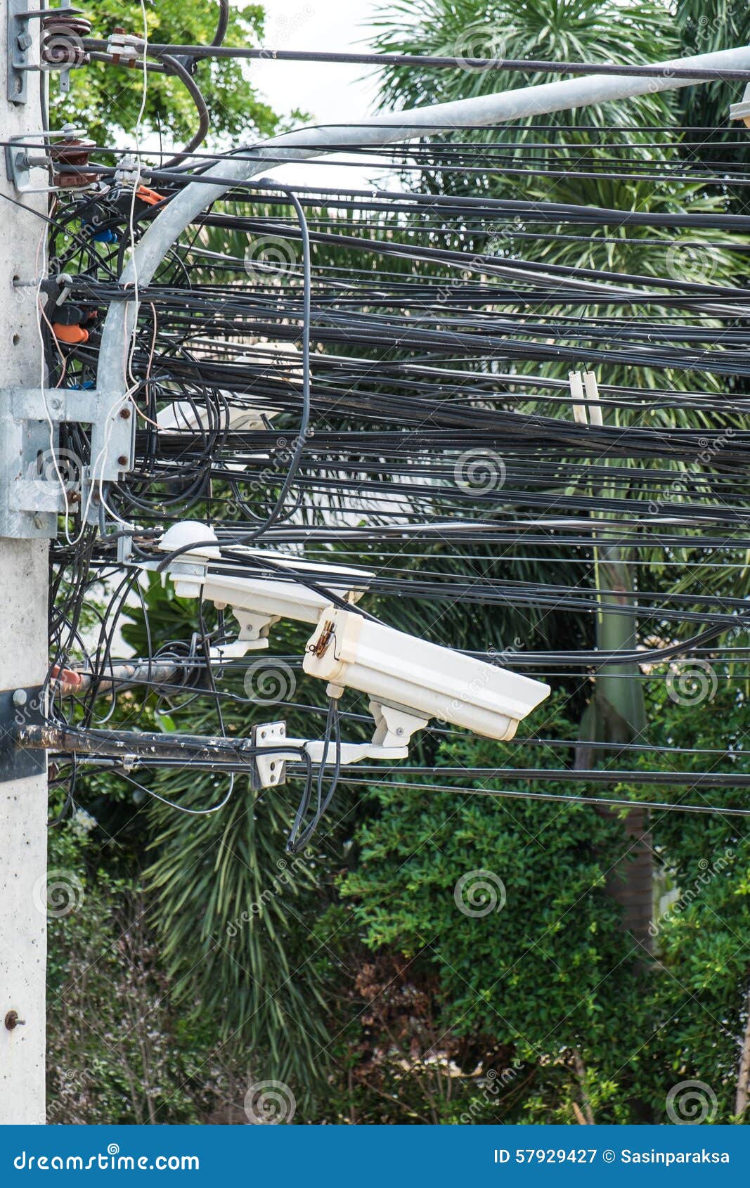 Security Camera on Electric Pole with Maze Electric Cables Stock Image ...