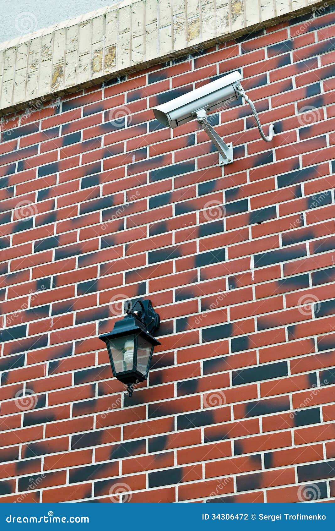 Security Camera and Flashlight on the Wall Stock Photo - Image of lamp ...