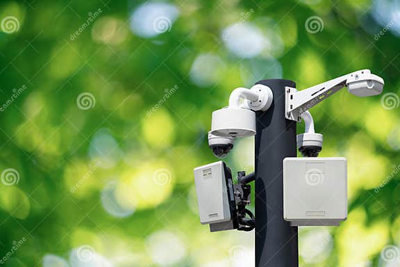 Security camera on a green stock image. Image of protection - 269133083