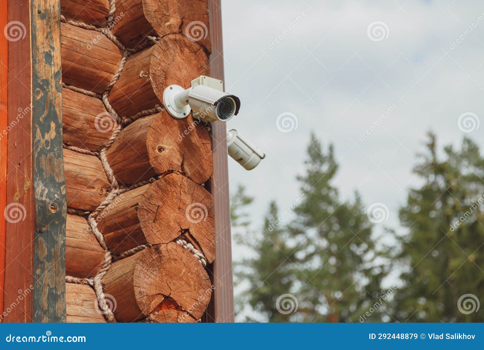 Security Camera Installed on the Corner of Log Wooden House Stock Image ...