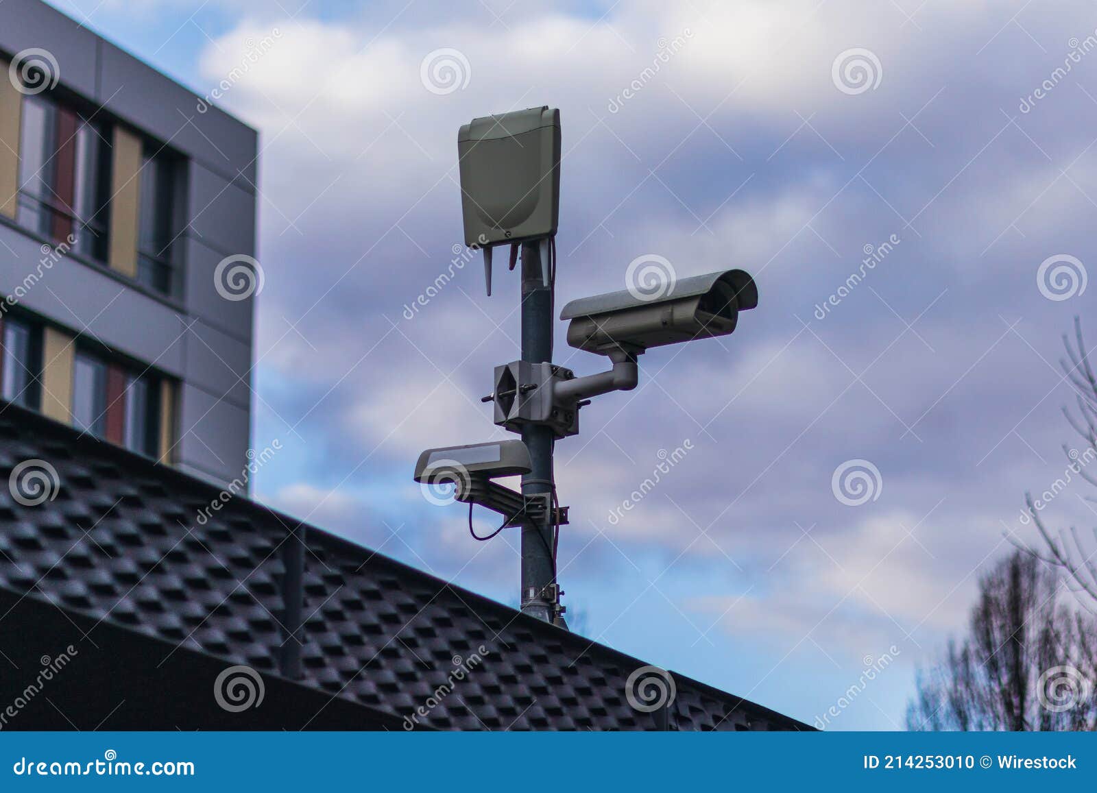 Security Camera on a Mast in Front of a Company Building Stock Photo ...