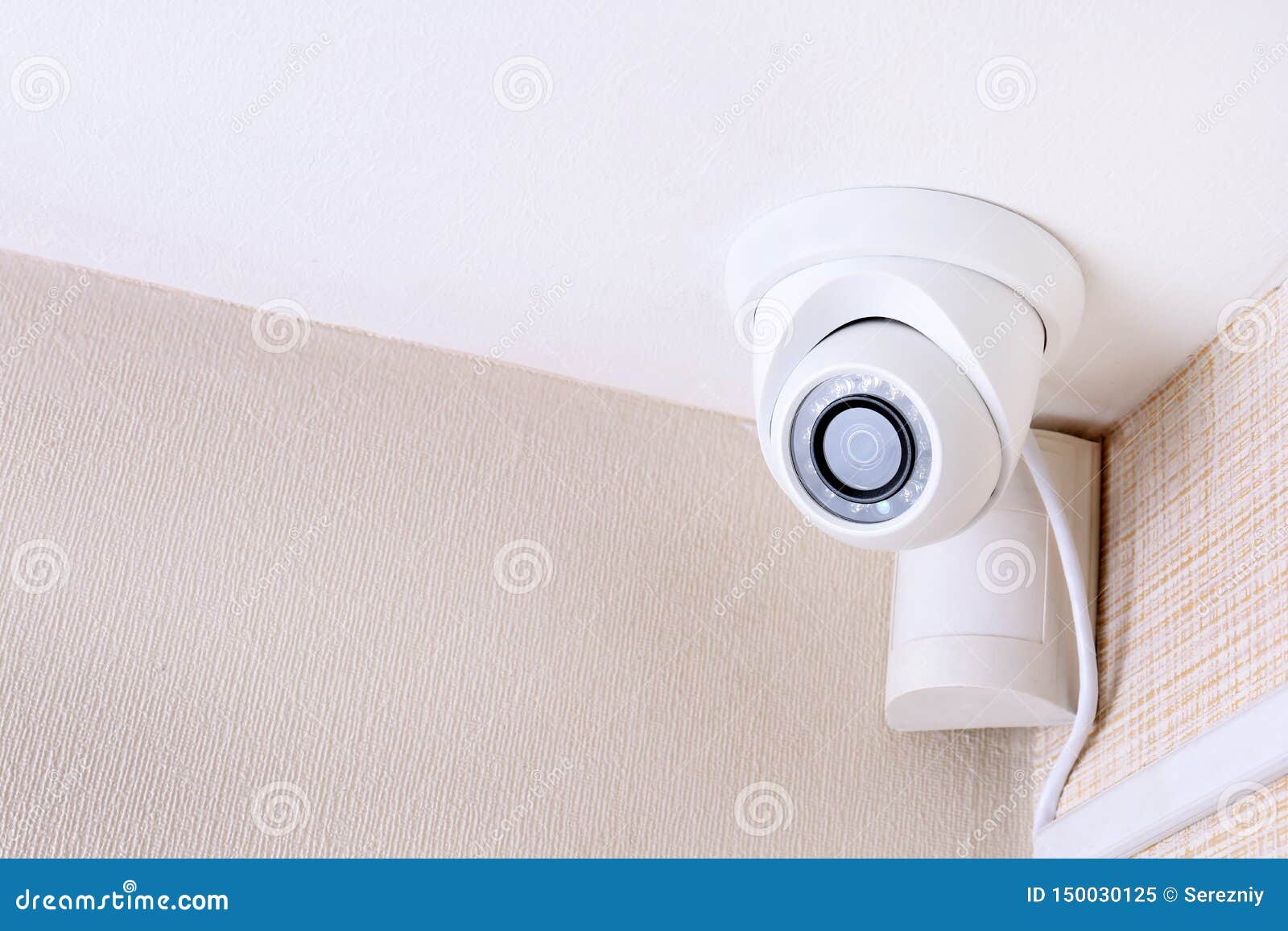 Security Camera and Motion Detector Installed on Ceiling in Room Stock ...