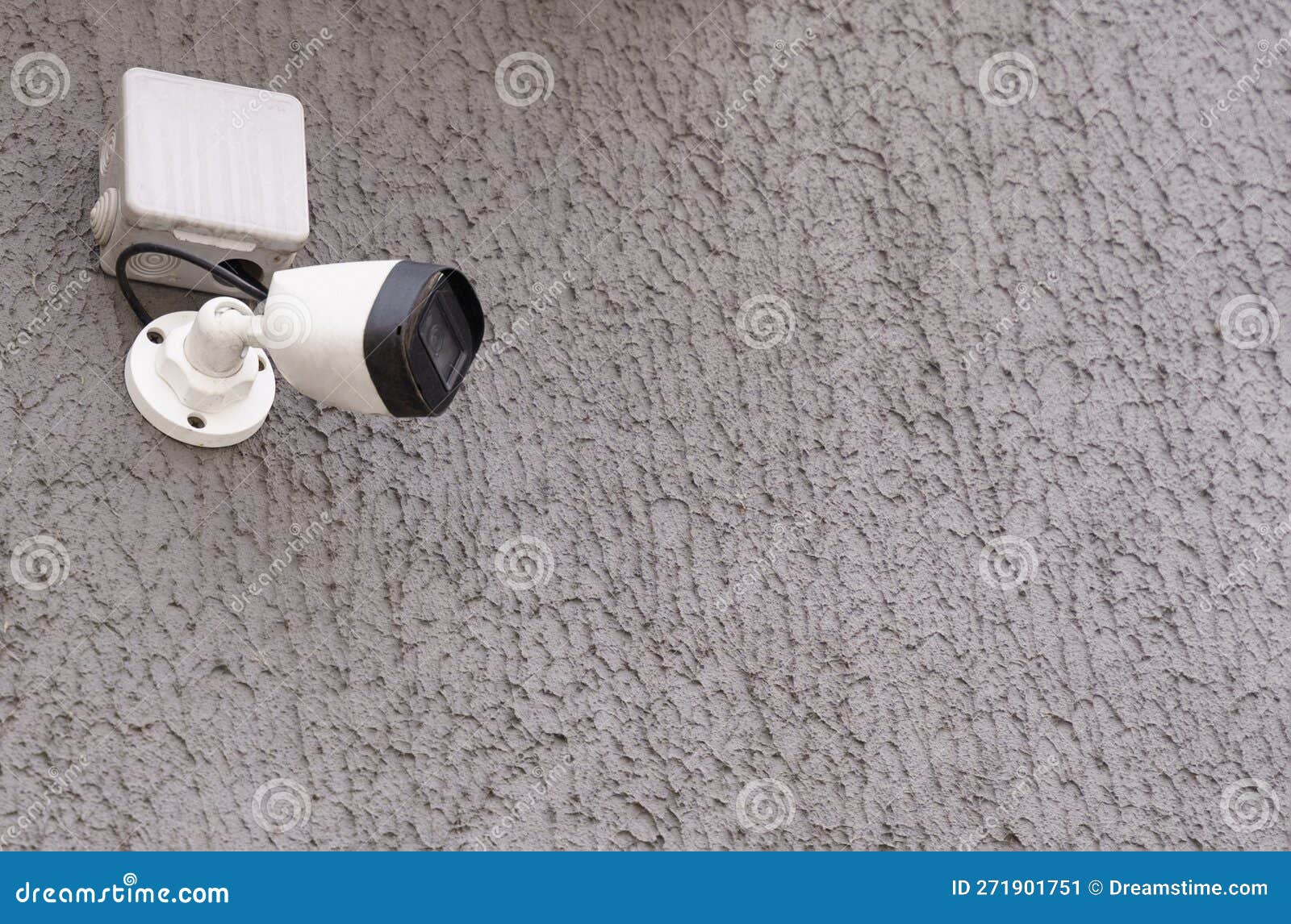 Security Camera Mounted on a Gray Wall, There is Space for Design in ...