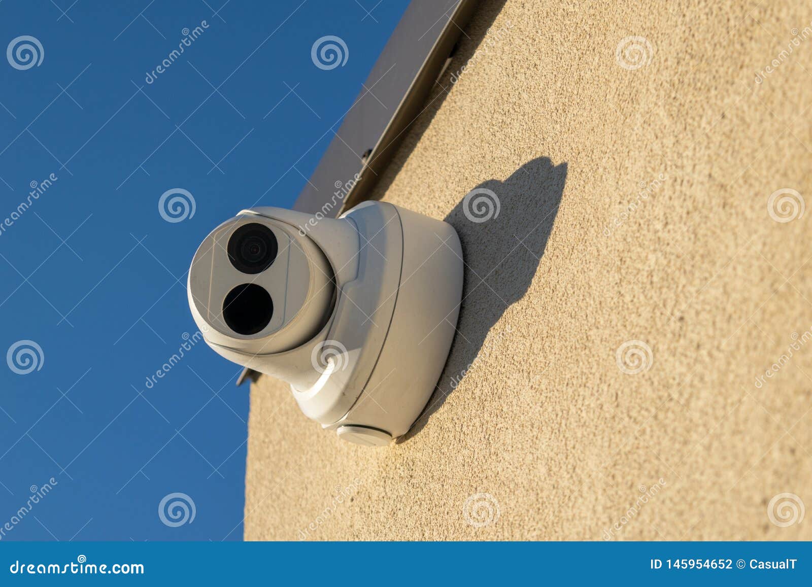 Security Camera Mounted on a Wall, Pointed Straight at the Viewer ...