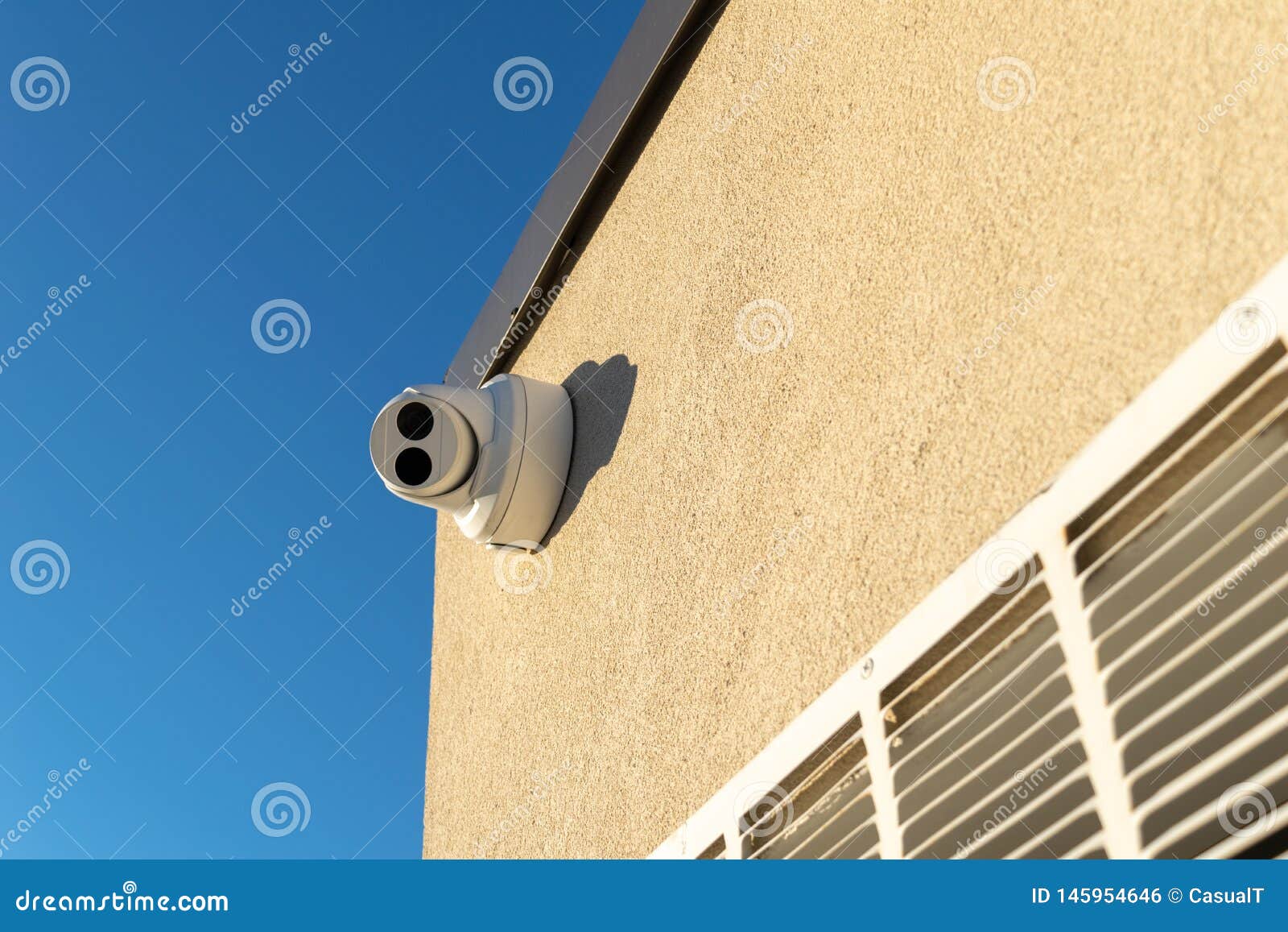 Security Camera Mounted on a Wall, Pointing Straight at the Viewer ...