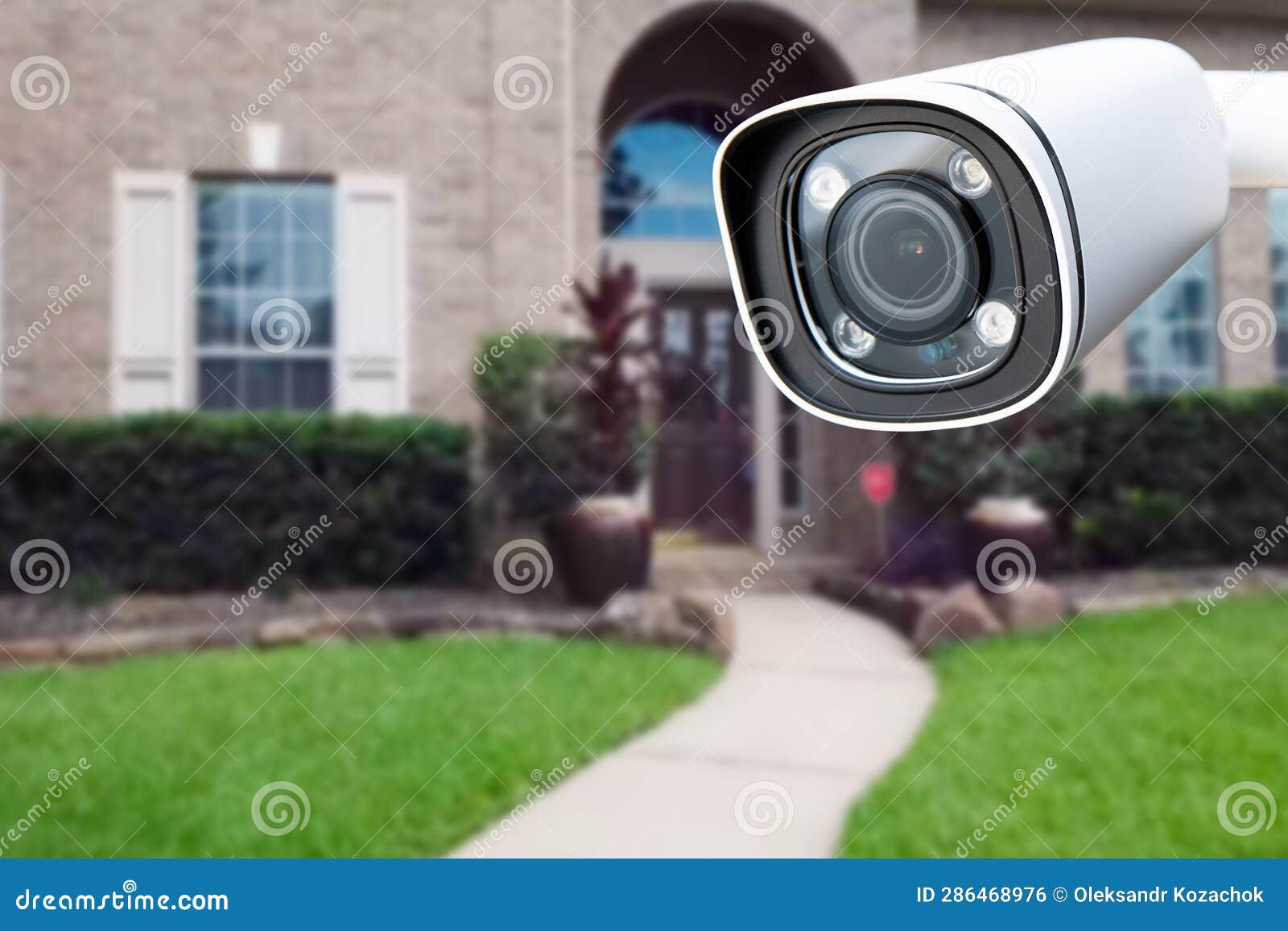 Security Camera and Private House on the Background. Stock Photo ...