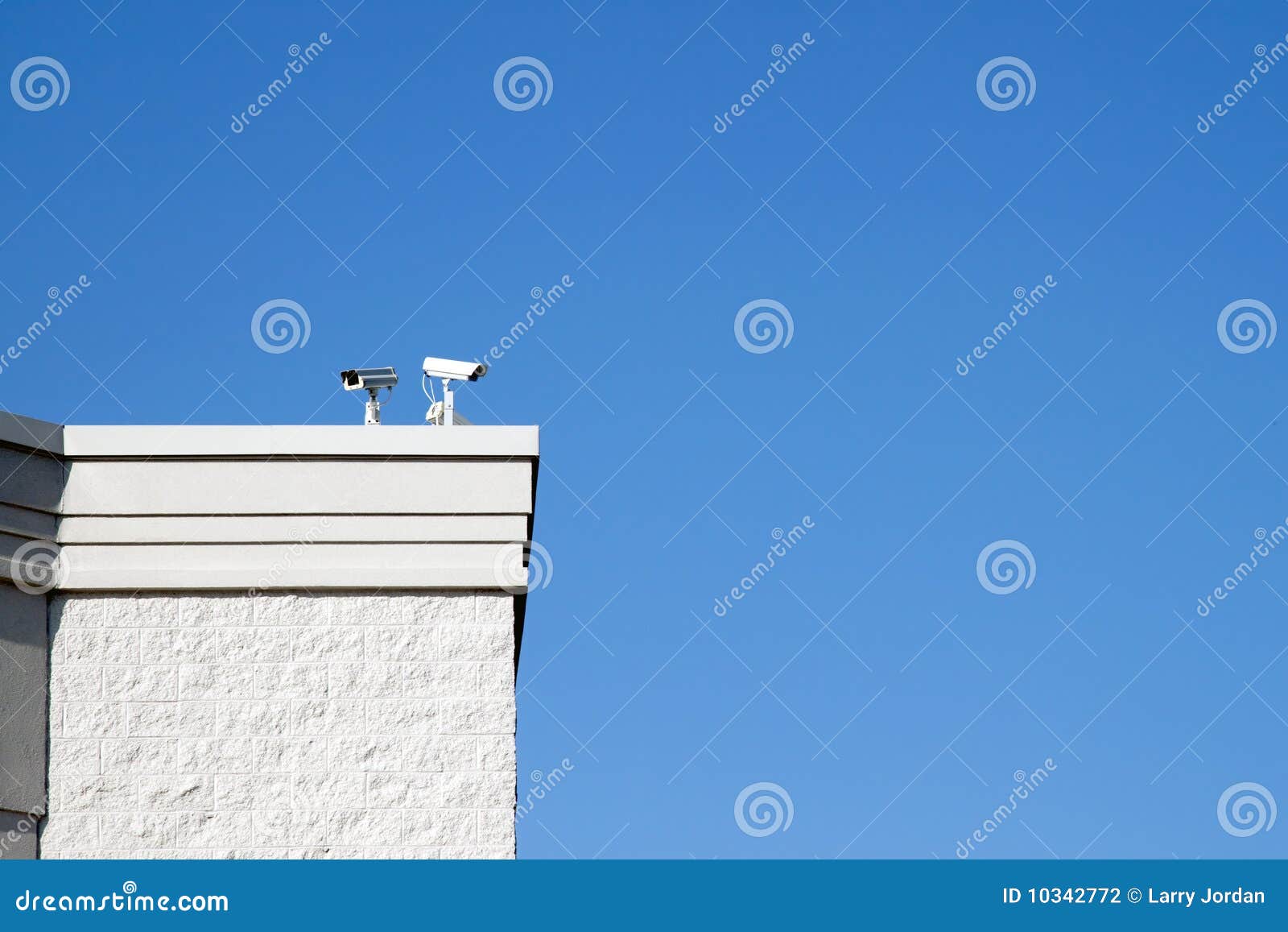 Security Cameras on Building Roof Stock Photo - Image of follow, camera ...