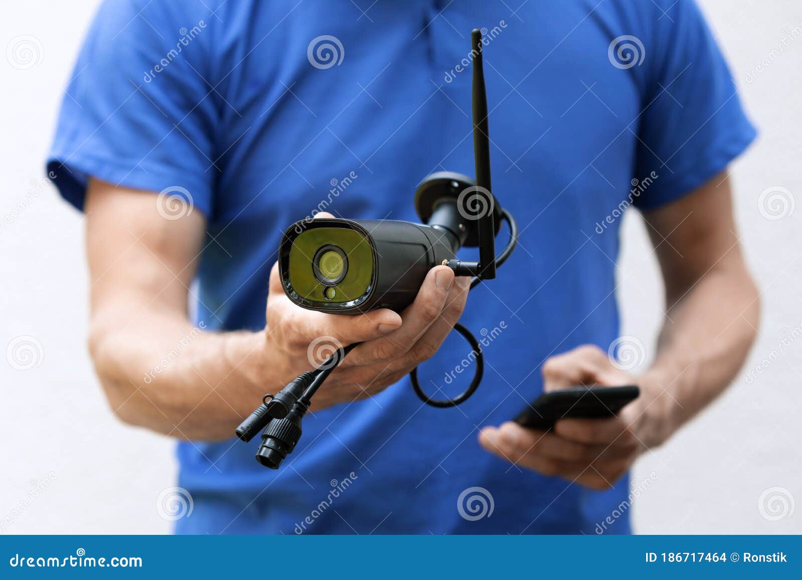 Security Cameras and Cctv Services - Technician with Ip Camera in Hand ...