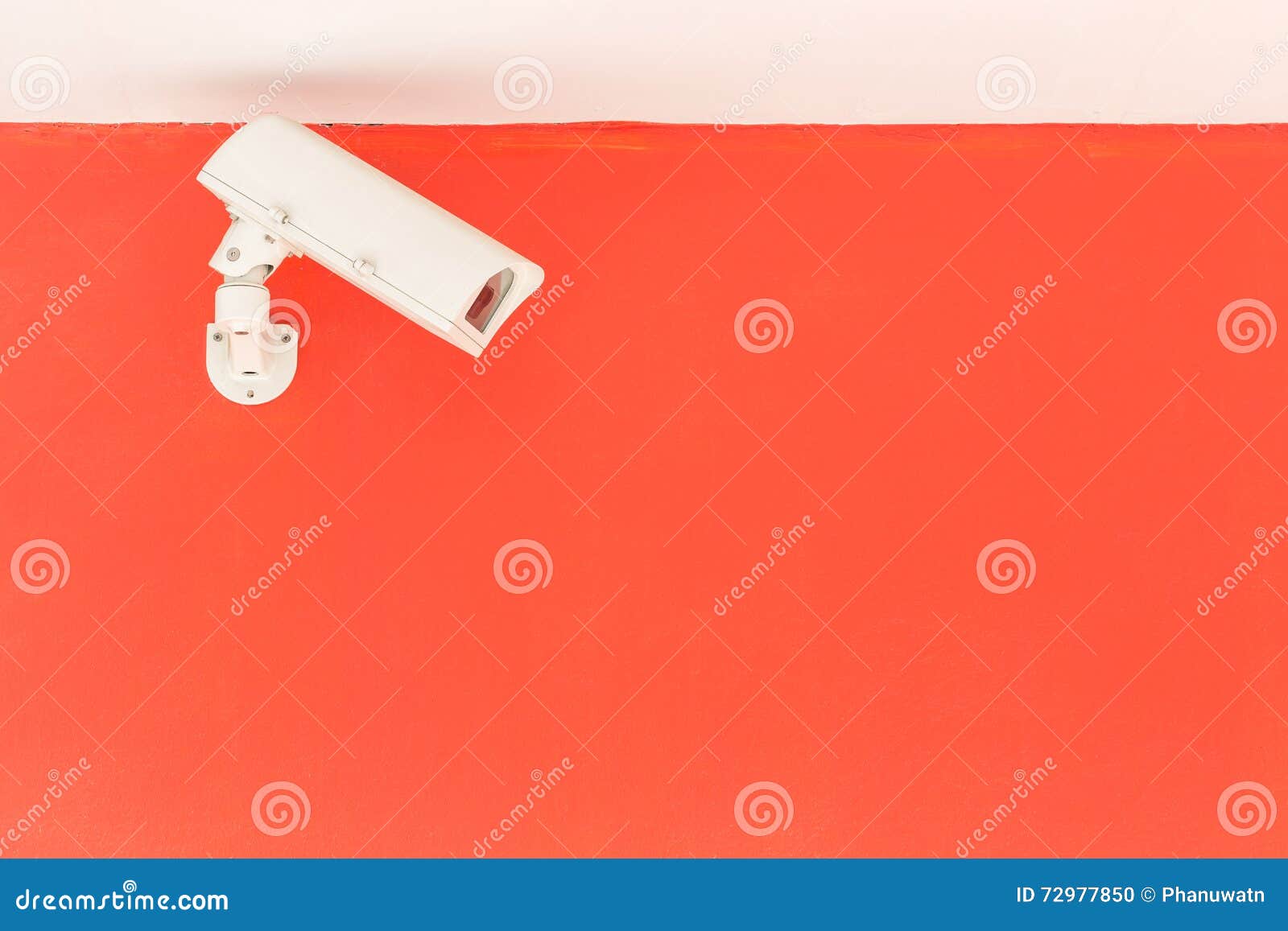 Security CCTV Camera Operating on the Red Building Wall Stock Photo ...