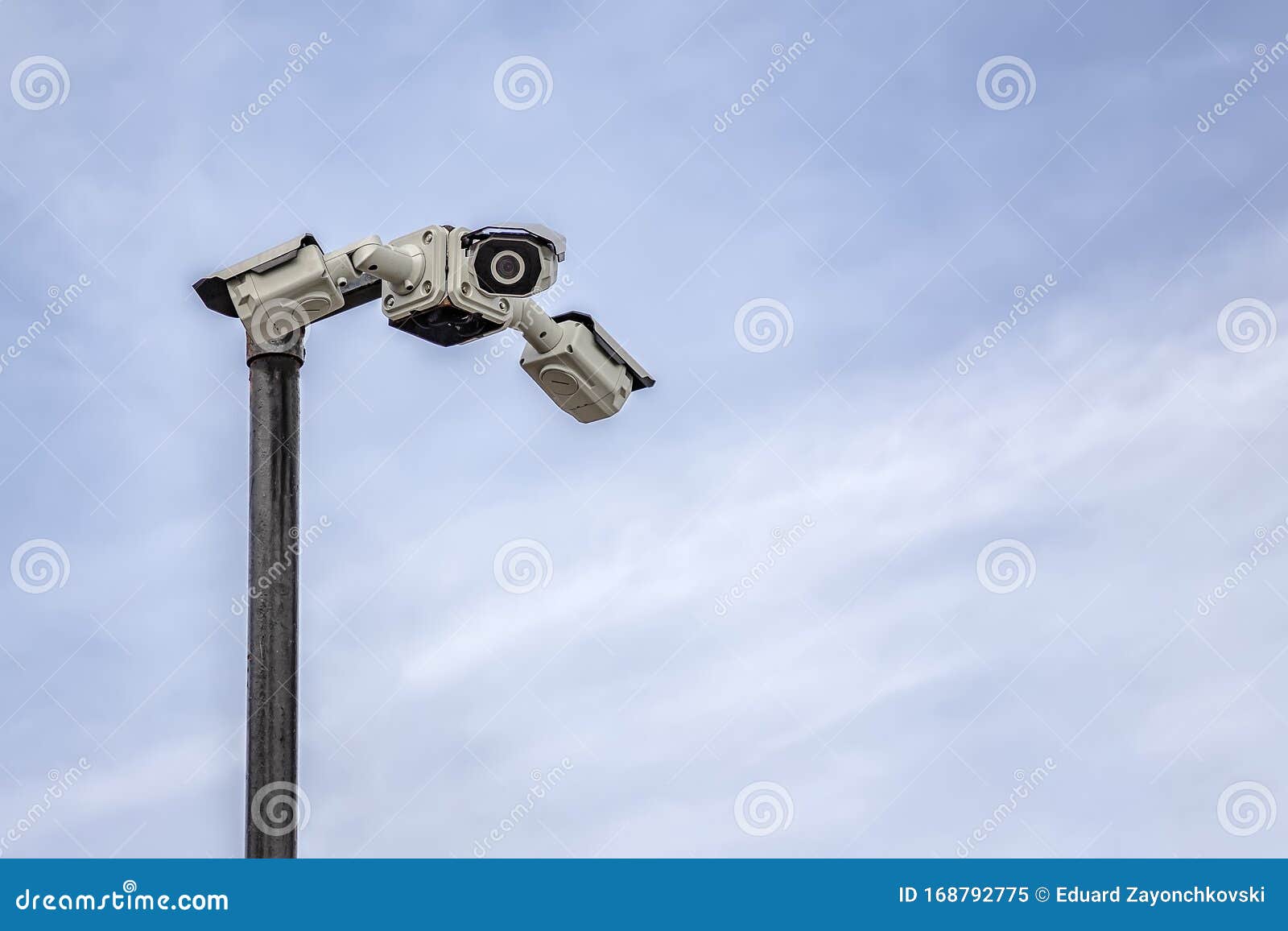 Security CCTV Cameras on a Pylon in the Sky Background Stock Image ...