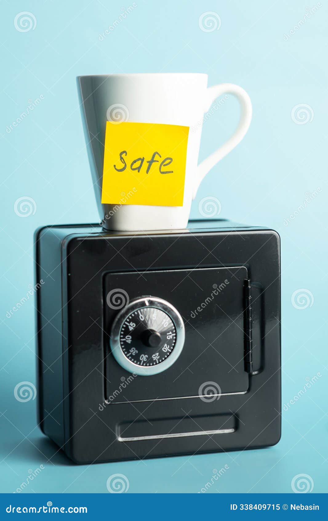 Security Concept: Cup Balanced on Safe with Sticky Note Stock Image ...