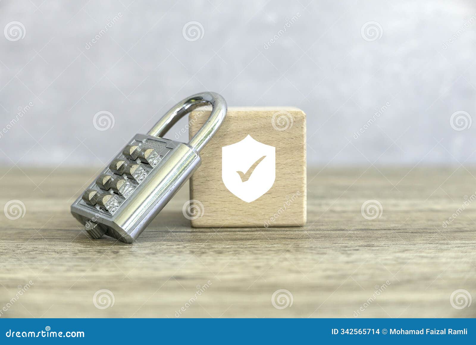 Security Concept: Metal Padlock and Wooden Block with Shield and ...