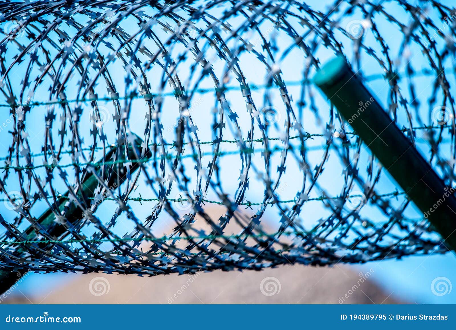 Security fence barbed wire stock image. Image of military - 194389795
