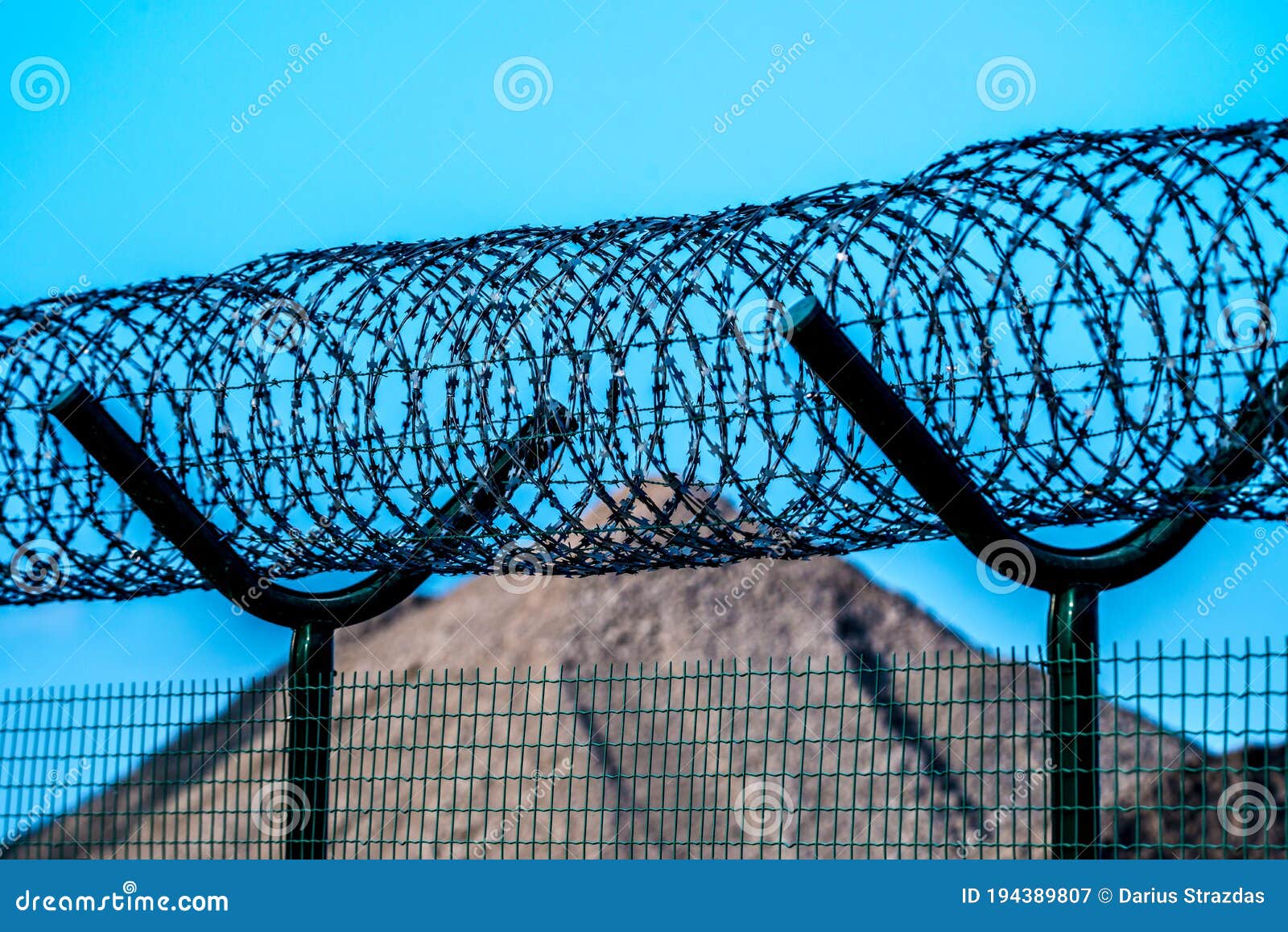 Security fence barbed wire stock image. Image of protection - 194389807