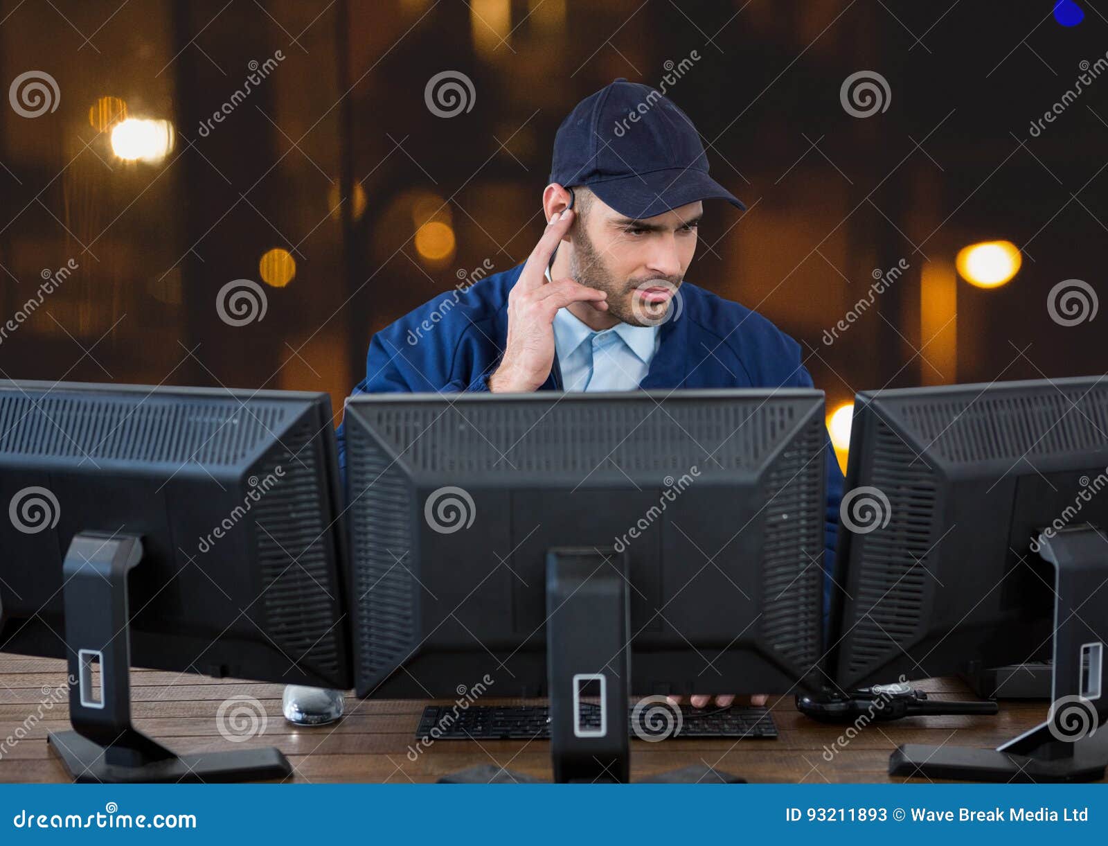 Security Guard Behind the Screens in the Office at Night Stock Image ...