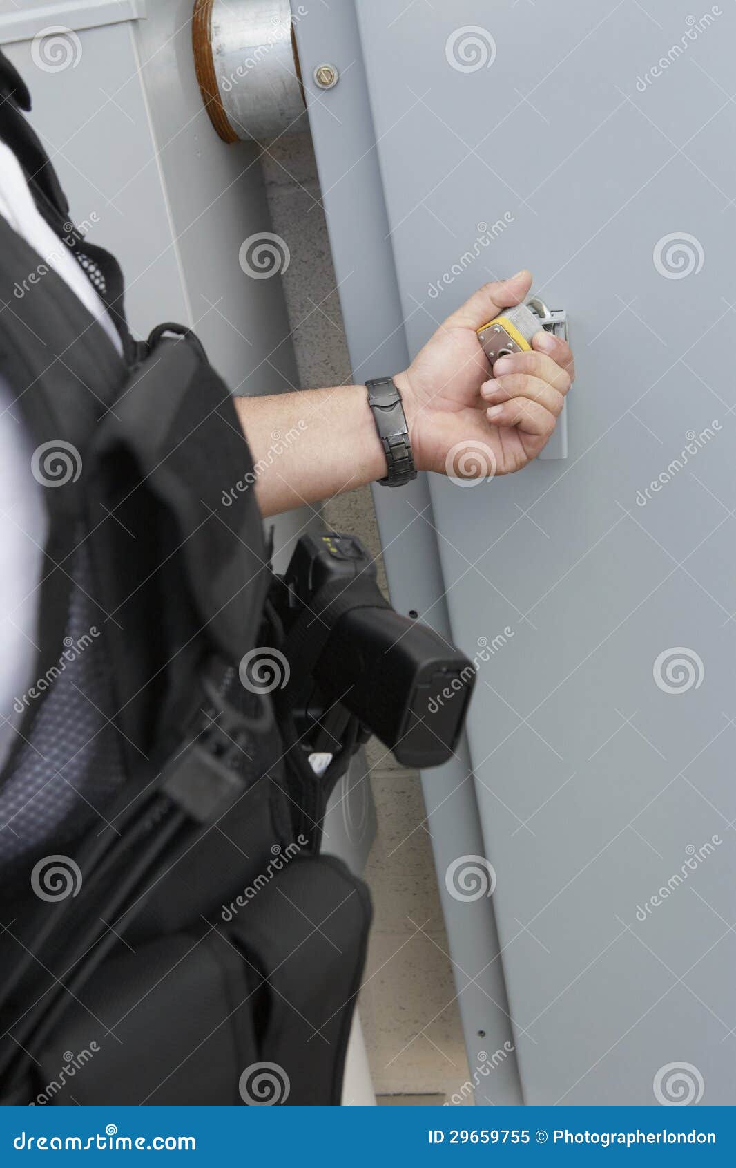 Security Guard Checking Padlock Stock Image - Image of padlock, safety ...